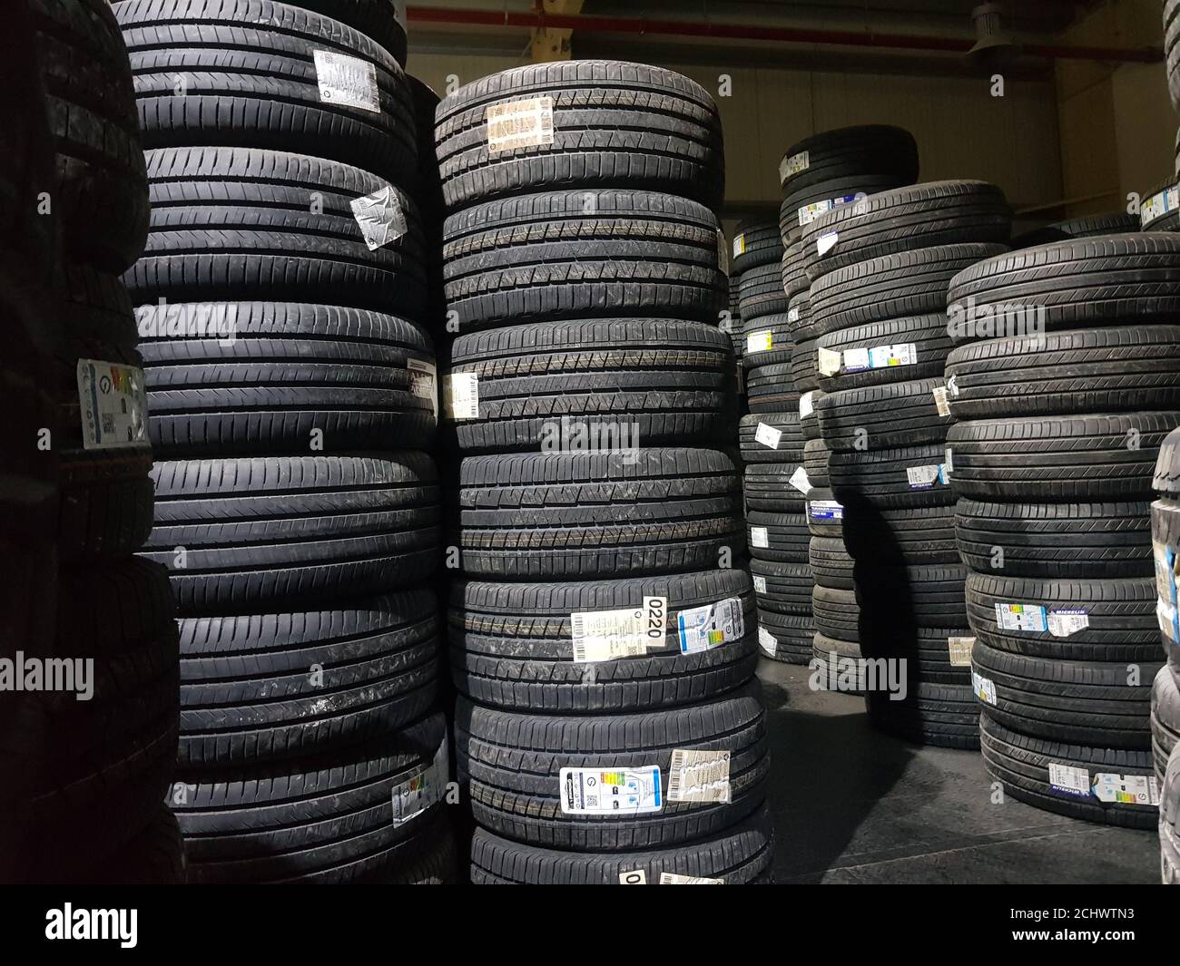 Car tyre warehouse Stock Photo - Alamy