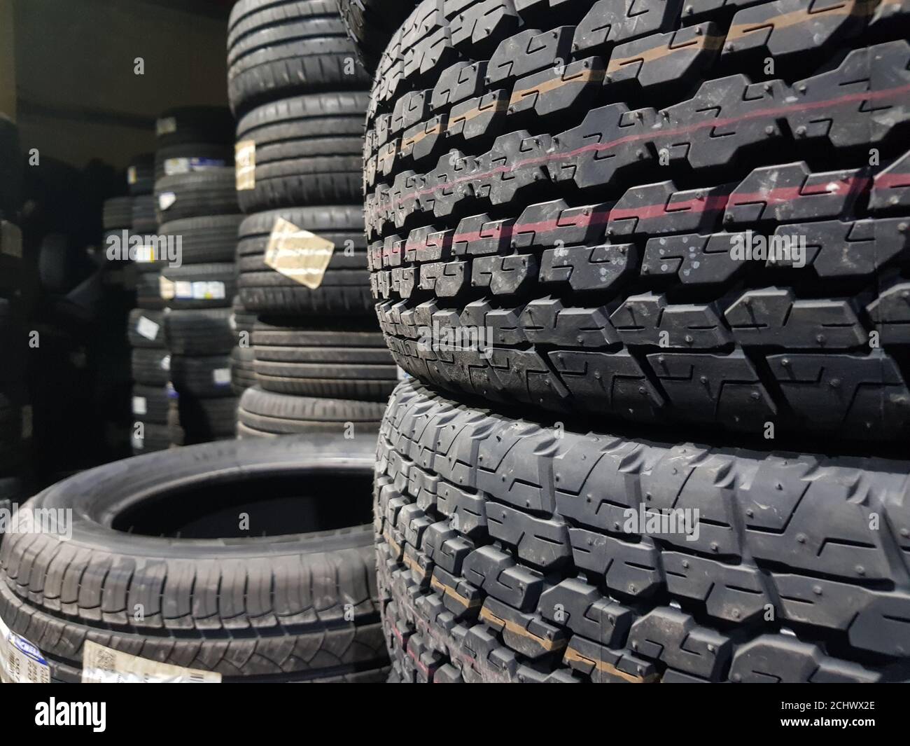 Car tyre warehouse Stock Photo - Alamy