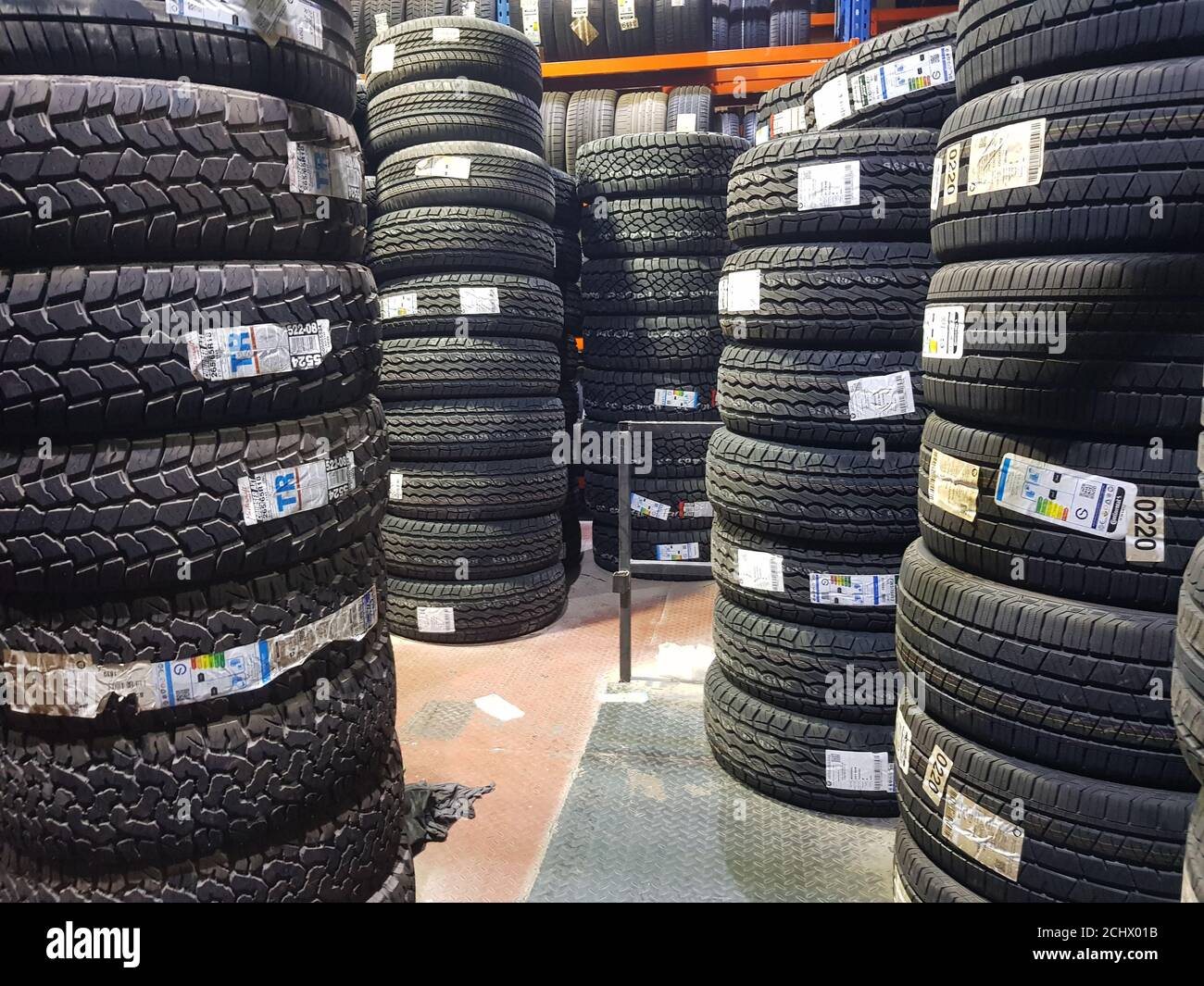 Car tyre warehouse Stock Photo - Alamy