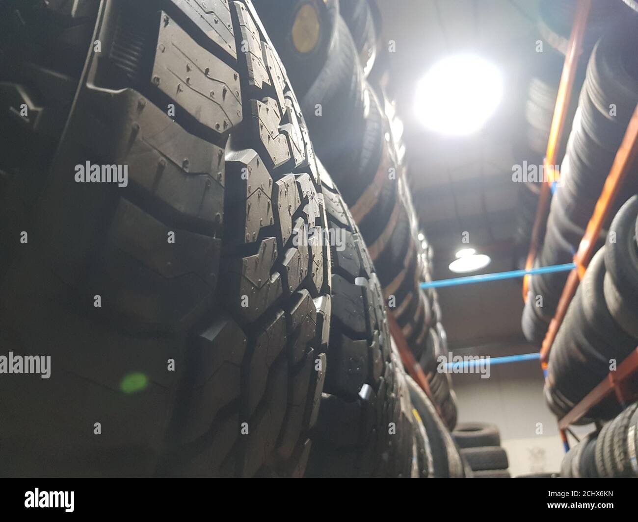Car tyre warehouse Stock Photo - Alamy