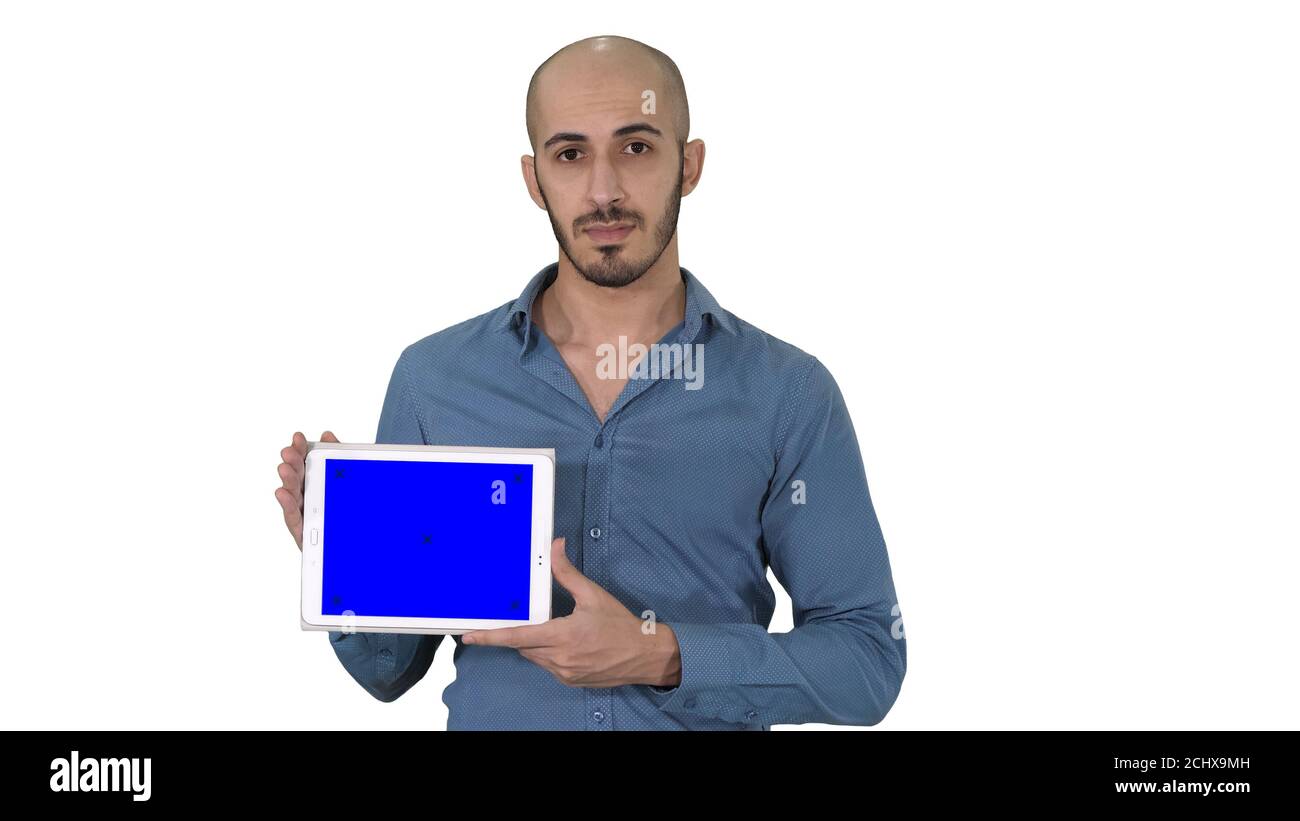 Arab man showing blank tablet screen on white background Stock Photo ...