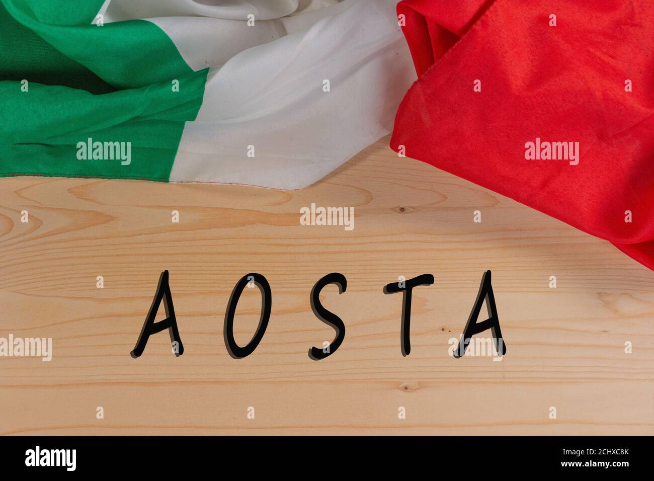 Italian flag isolated on wooden background with lettering of famous ...