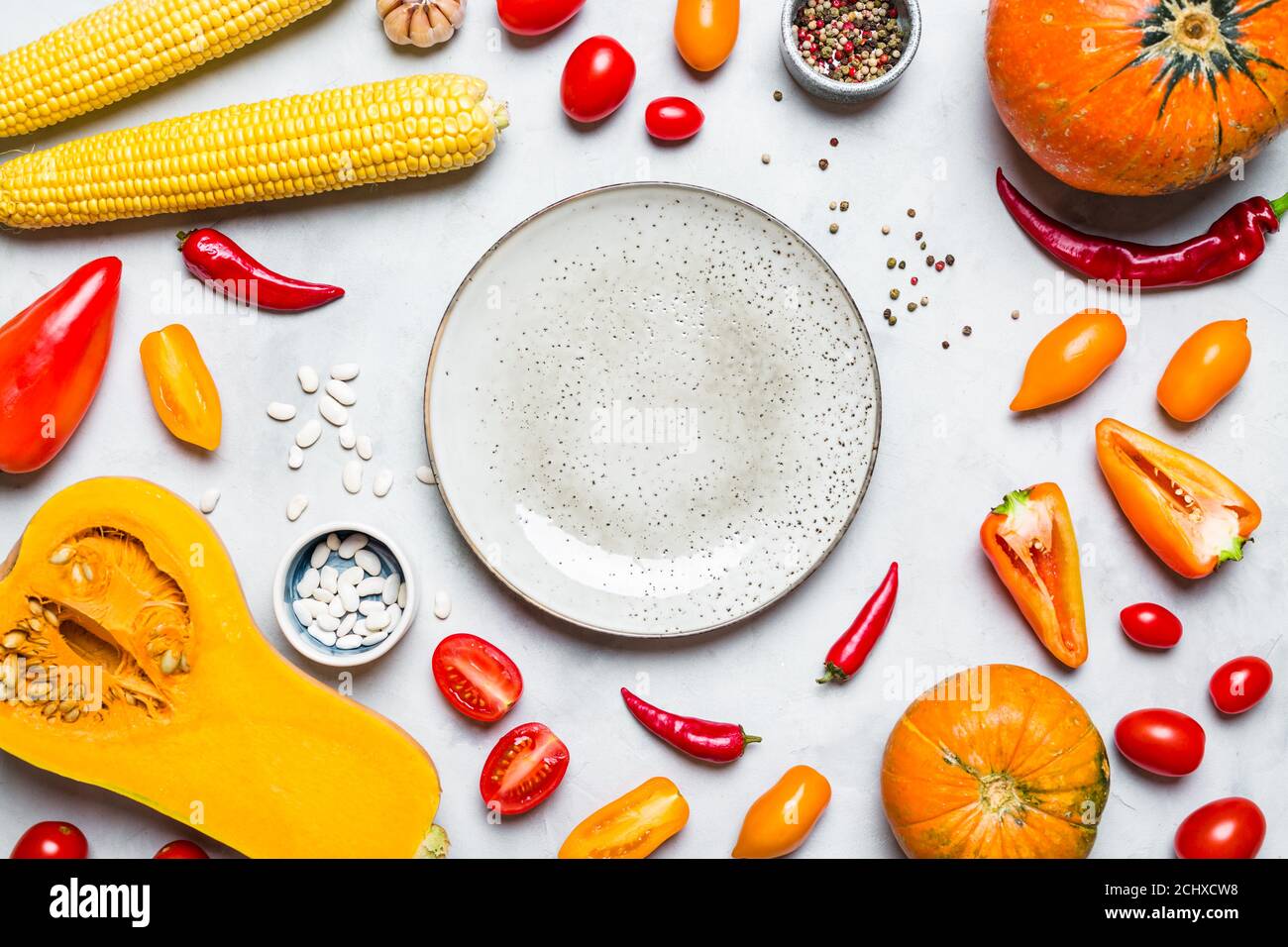 Ceramic plate and fresh vegetables. Food frame. Copy spice Stock Photo ...