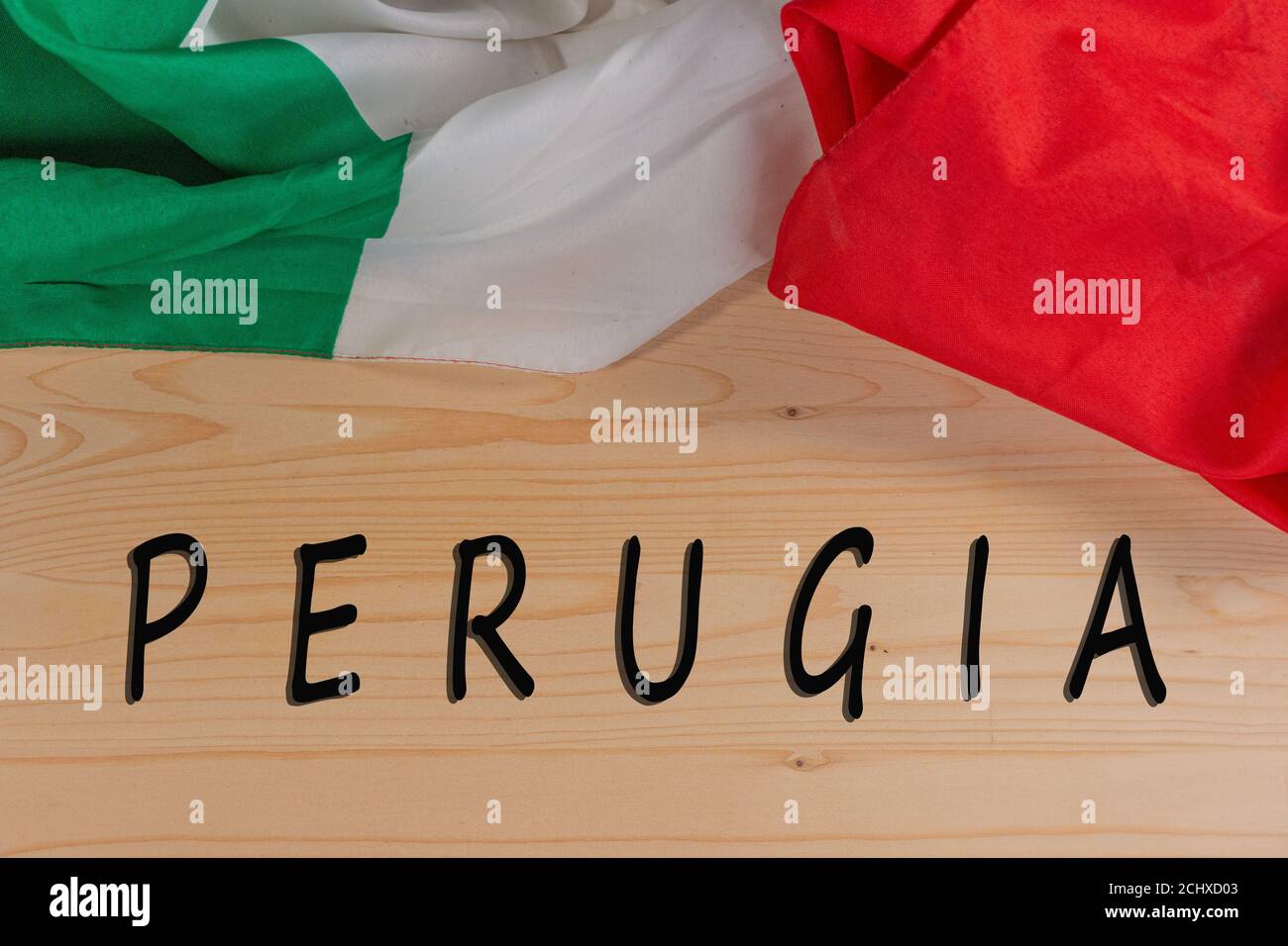 Italian flag isolated on wooden background with lettering of famous ...