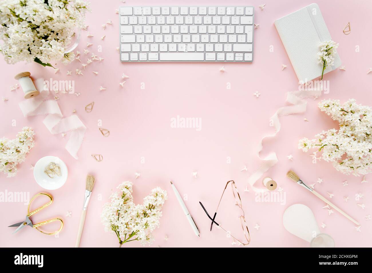 Office table desk with computer, lilac, clipboard. magazines. Top view ...
