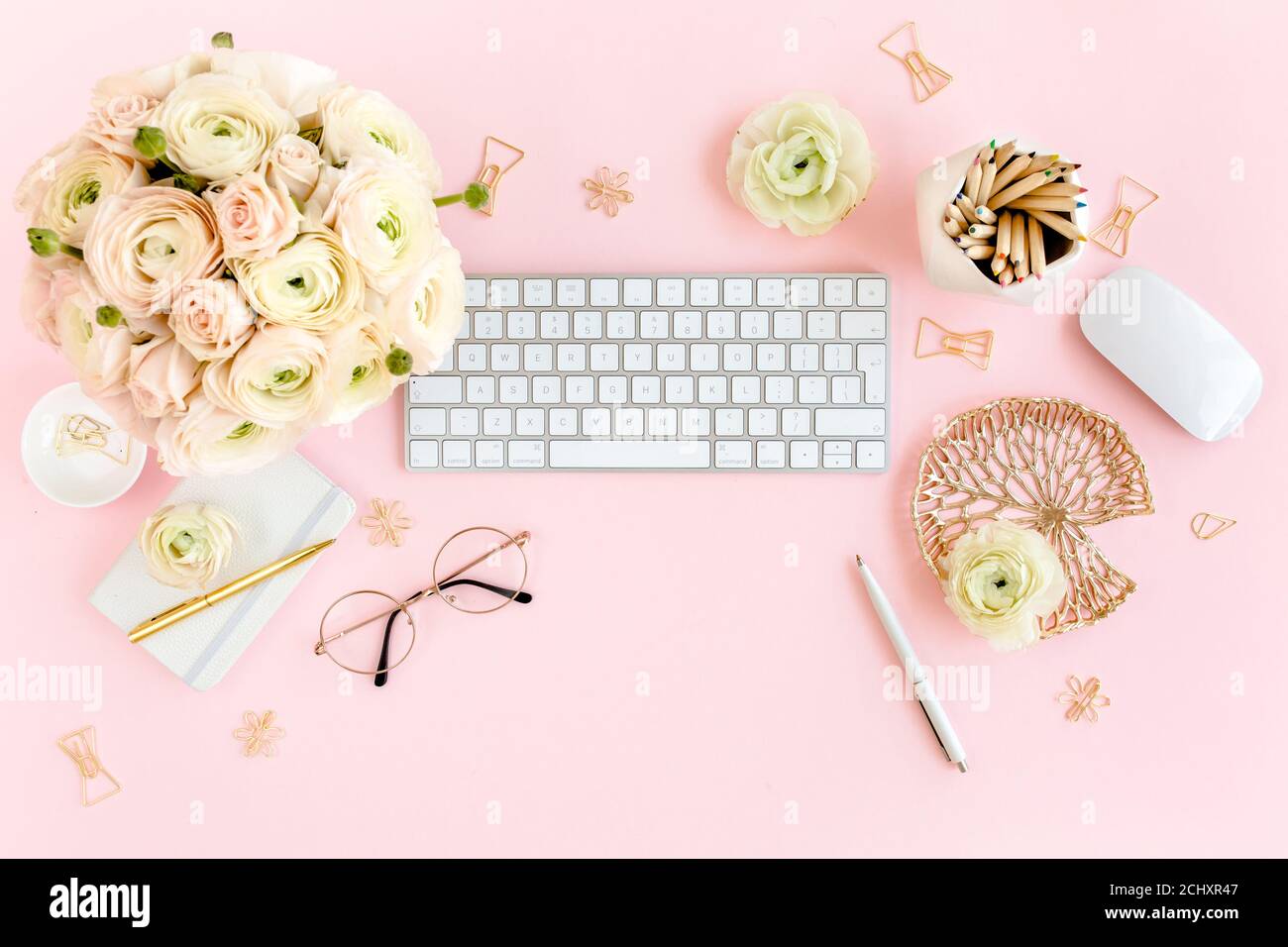 Stylized, pink women's home office desk. Workspace with computer ...