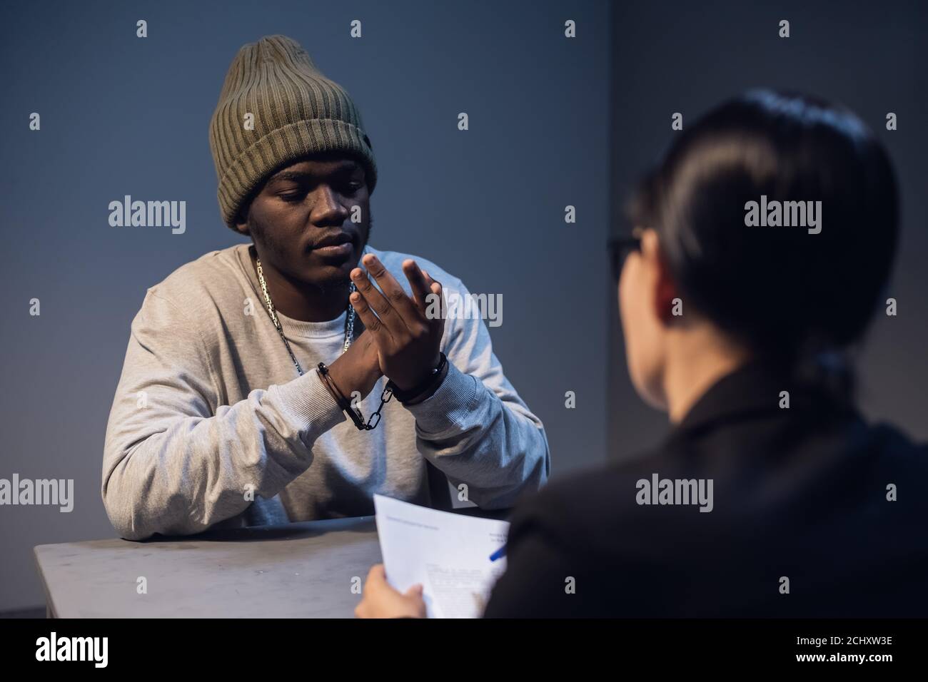 The suspect and his lawyer are considering a case management and ...