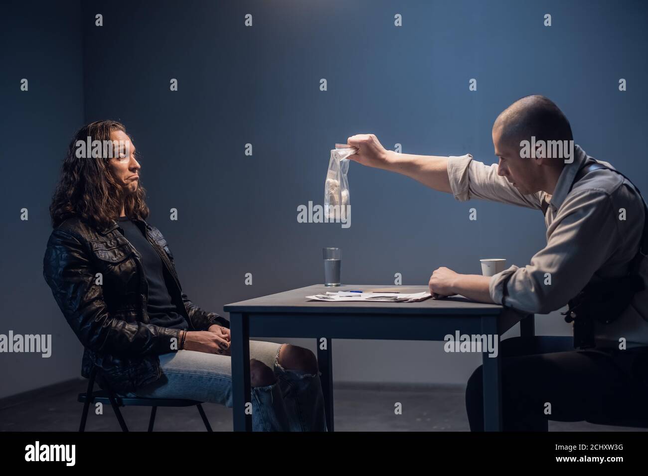Officer talking to suspect in handcuffs hi-res stock photography and ...