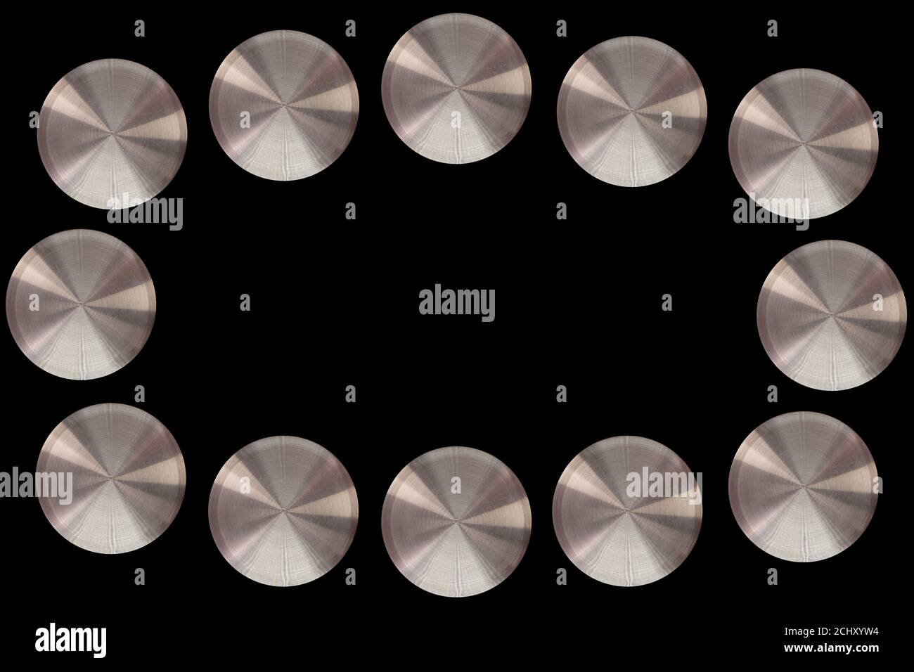 Stainless steel discs isolated on black background Stock Photo - Alamy
