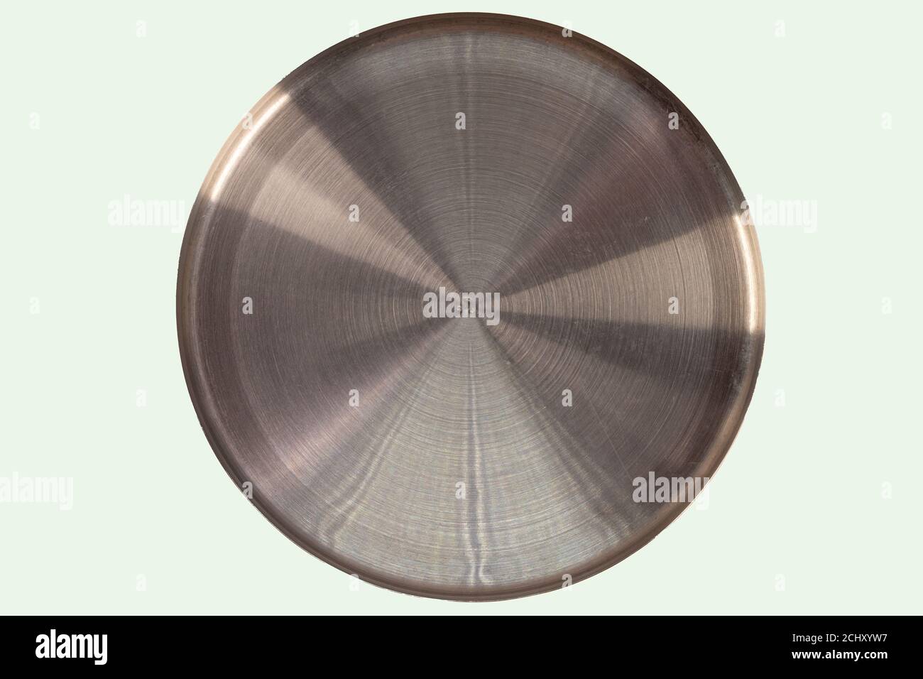 Stainless steel disc isolated on colored background Stock Photo - Alamy