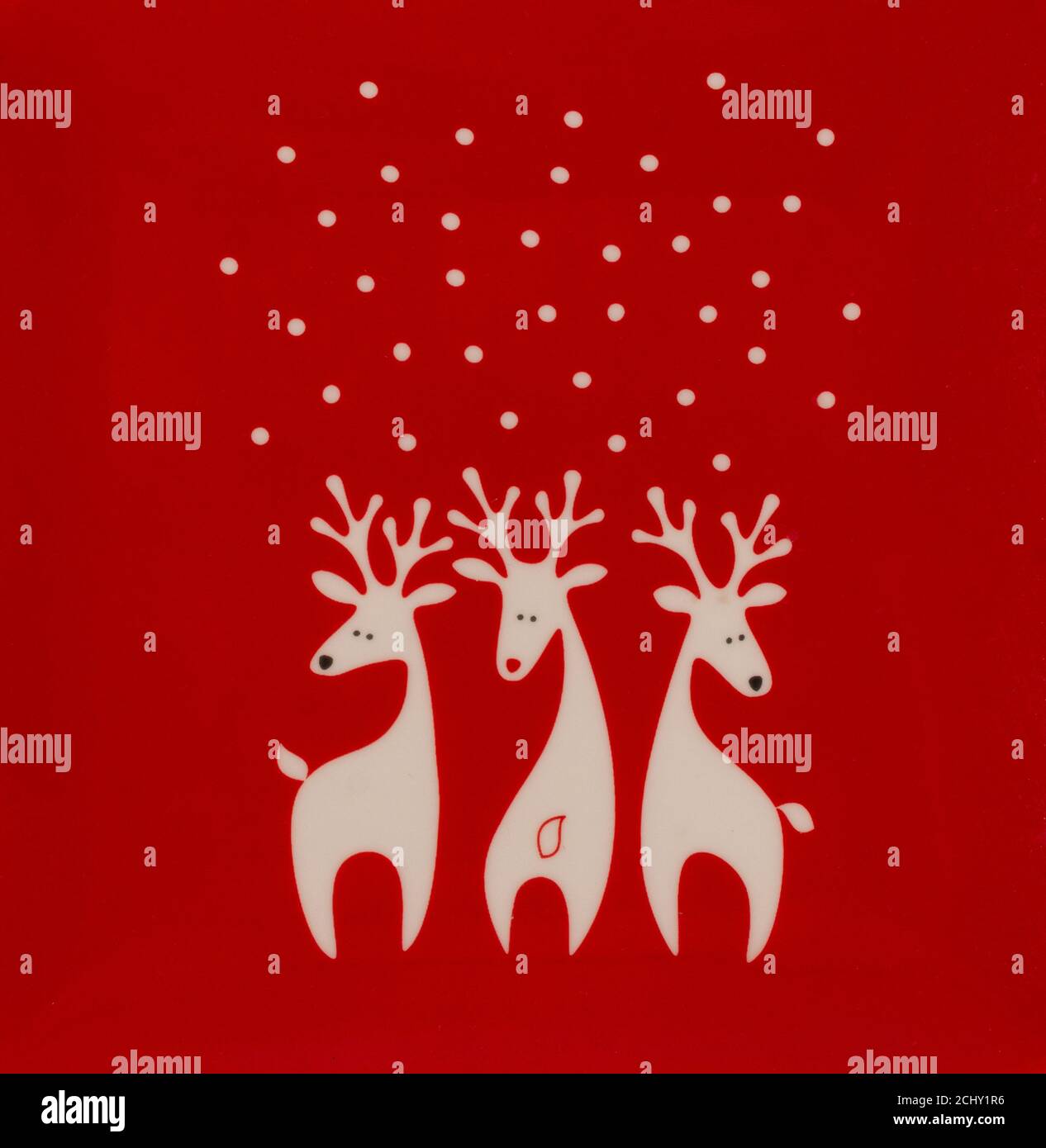 Stylized reindeer on a red background. Christmas concept Stock Photo ...
