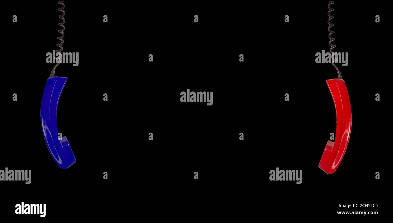 Analog phone isolated on black background. Communications assistance ...