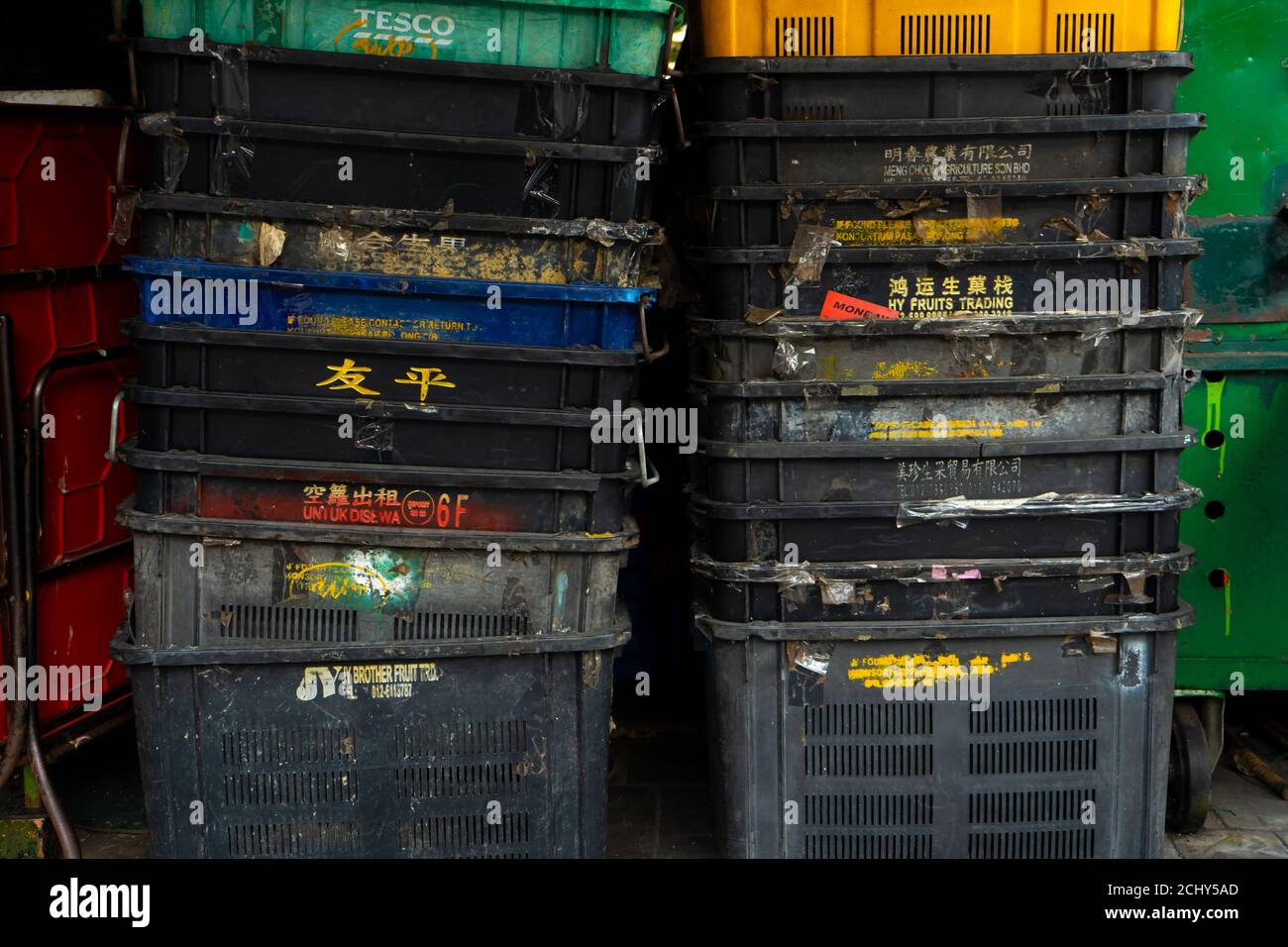 Dirty plastic boxes for transporting fruits Stock Photo - Alamy