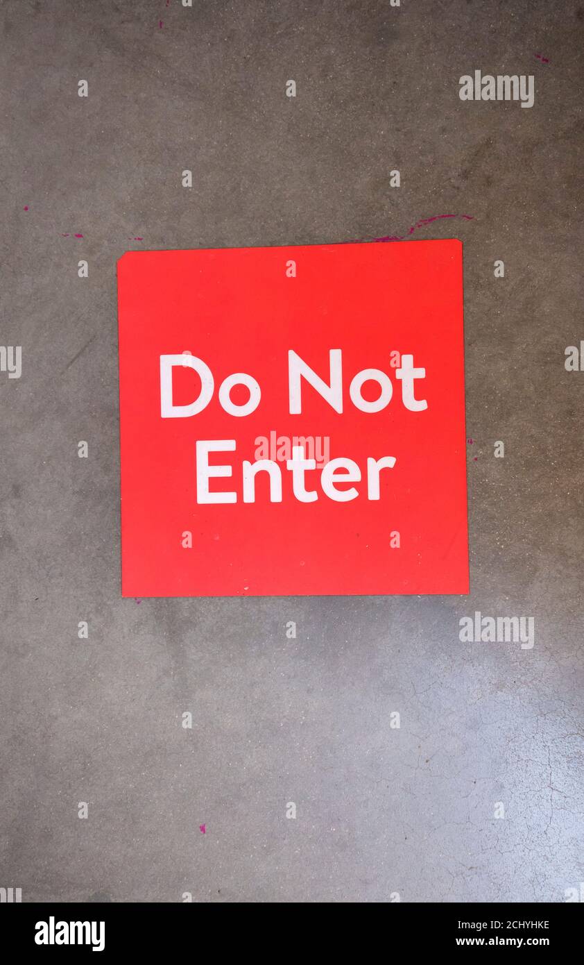 Covid 19 directional shopping signs inside store Stock Photo - Alamy