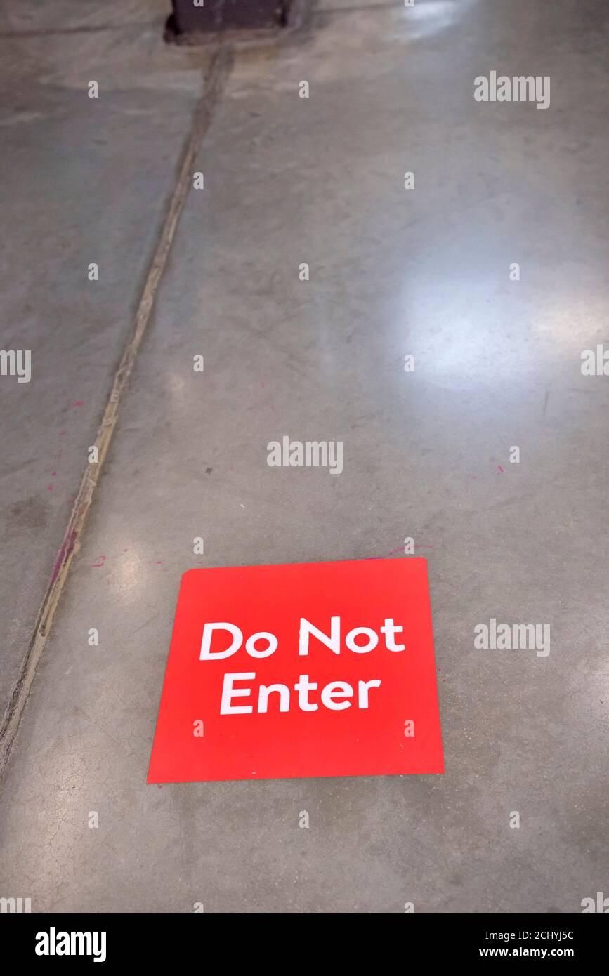 Covid 19 directional shopping signs inside store Stock Photo - Alamy