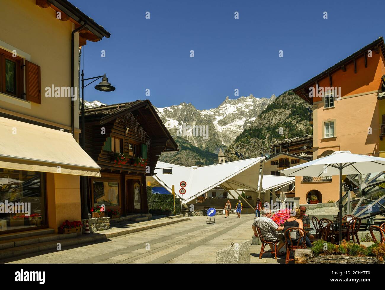 View of Via Roma street in the centre of the alpine town at the foot of ...