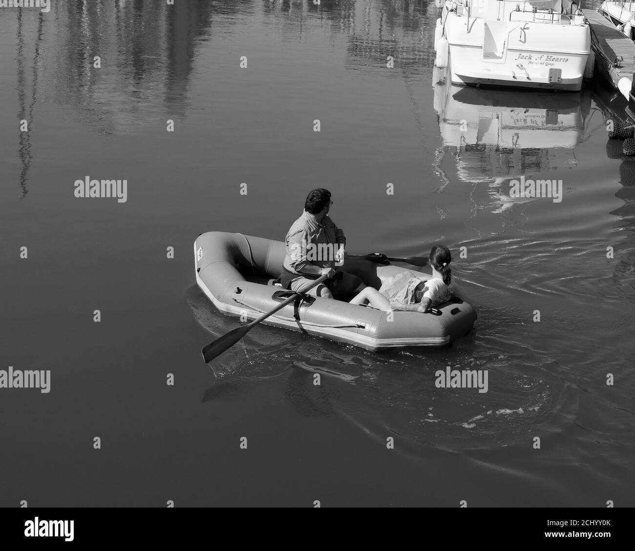 Two people in dingy Black and White Stock Photos & Images - Alamy