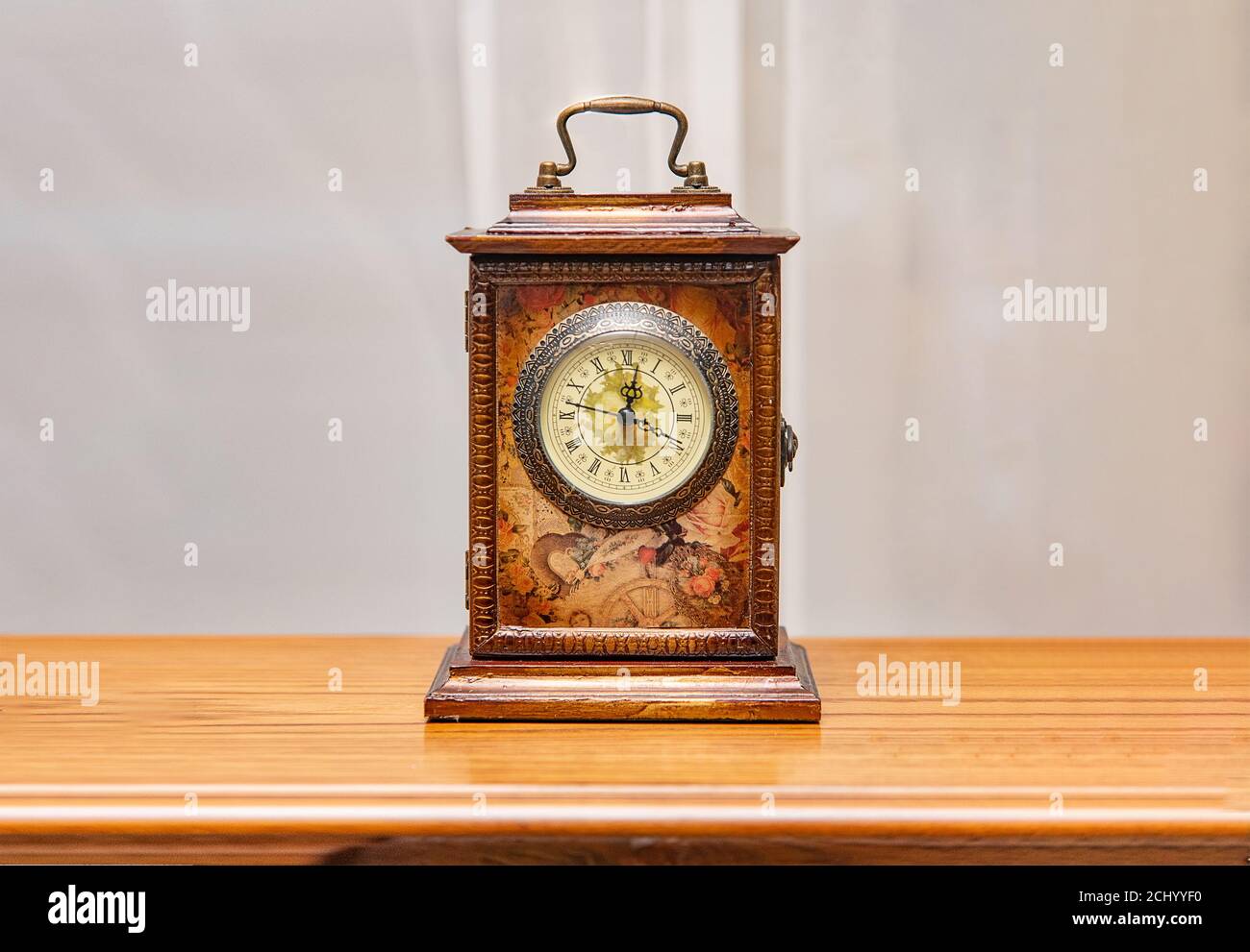 Square wooden vintage clock on a shelf Stock Photo - Alamy