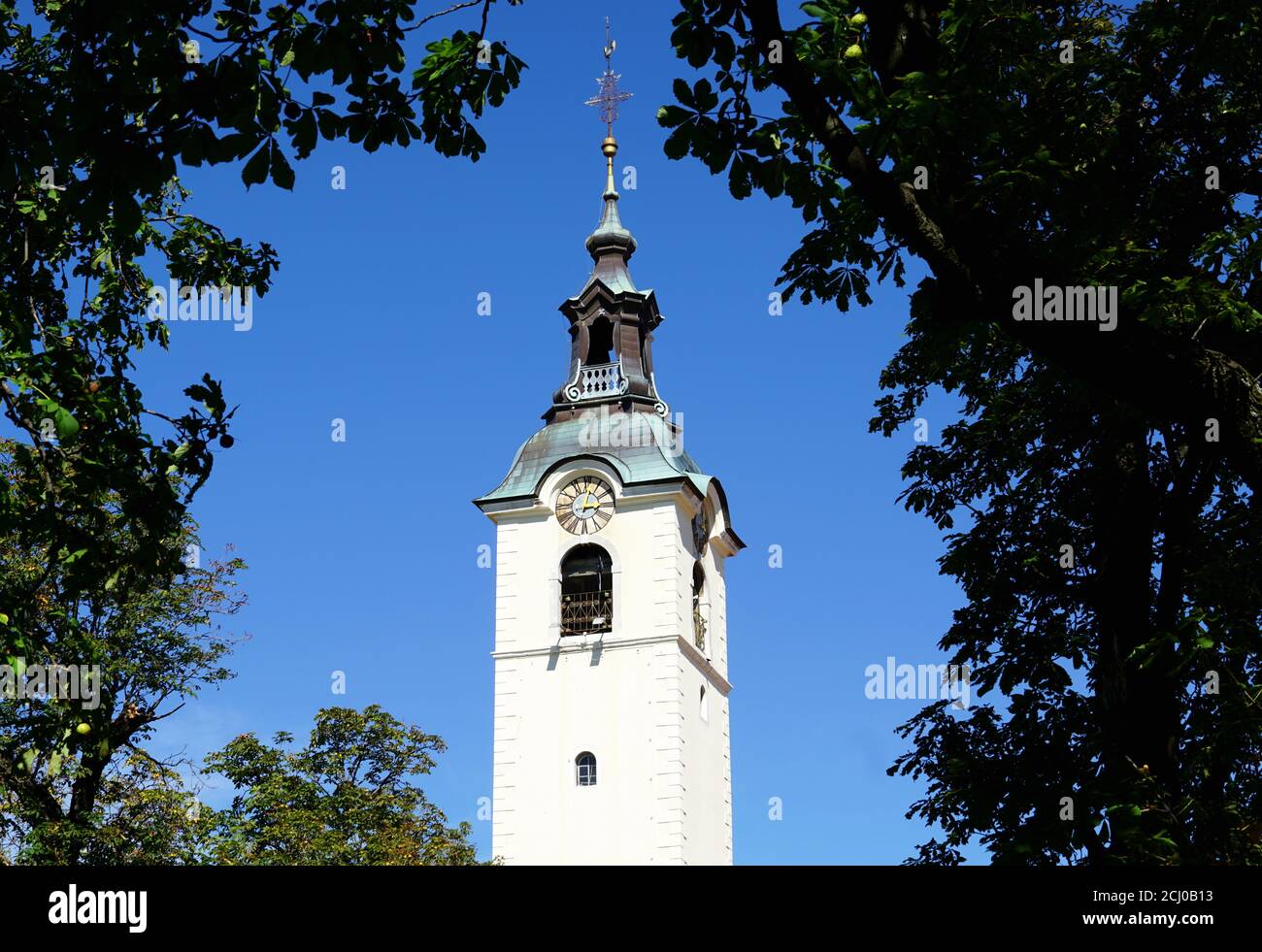 Top of white church bell tower in the Trsat, traditional religious ...