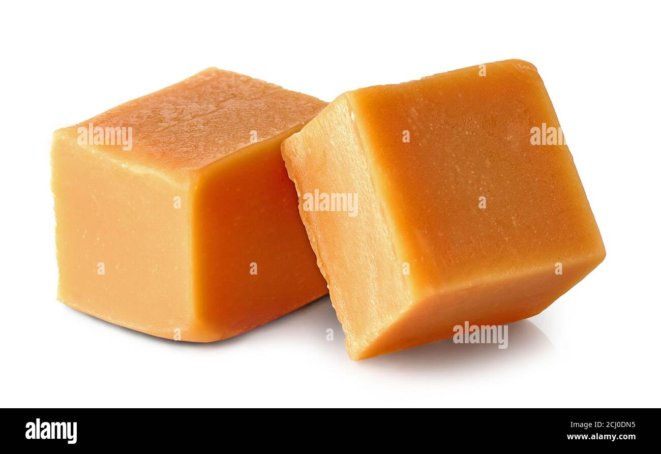 two caramel candies isolated on white background Stock Photo - Alamy