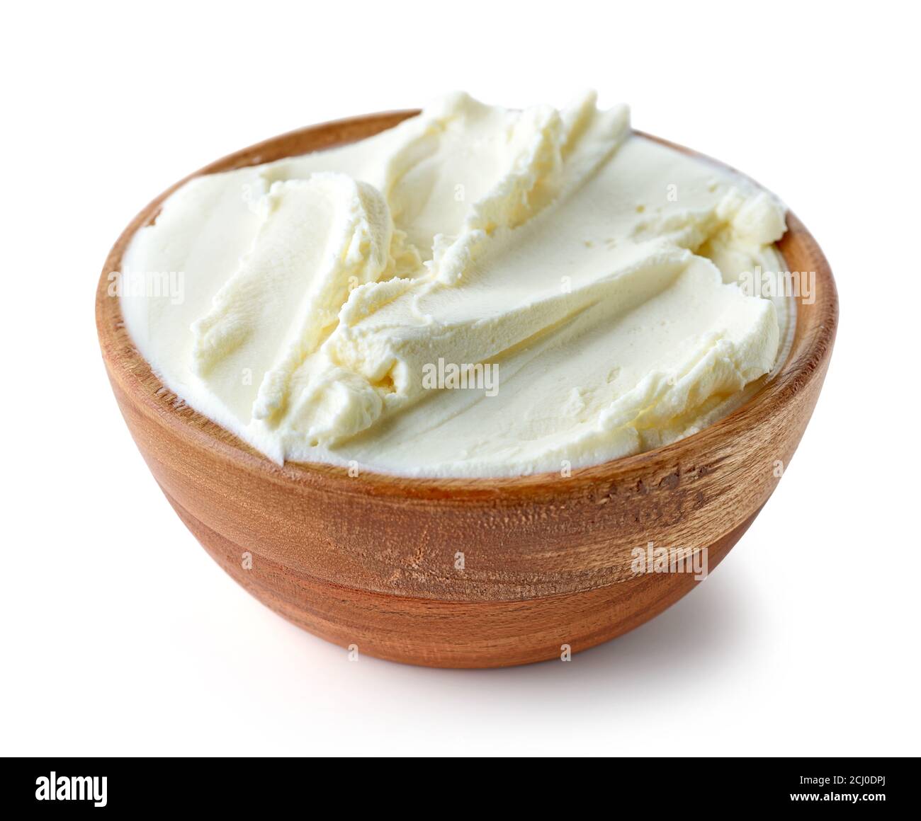 cream cheese in wooden bowl isolated on white background Stock Photo ...