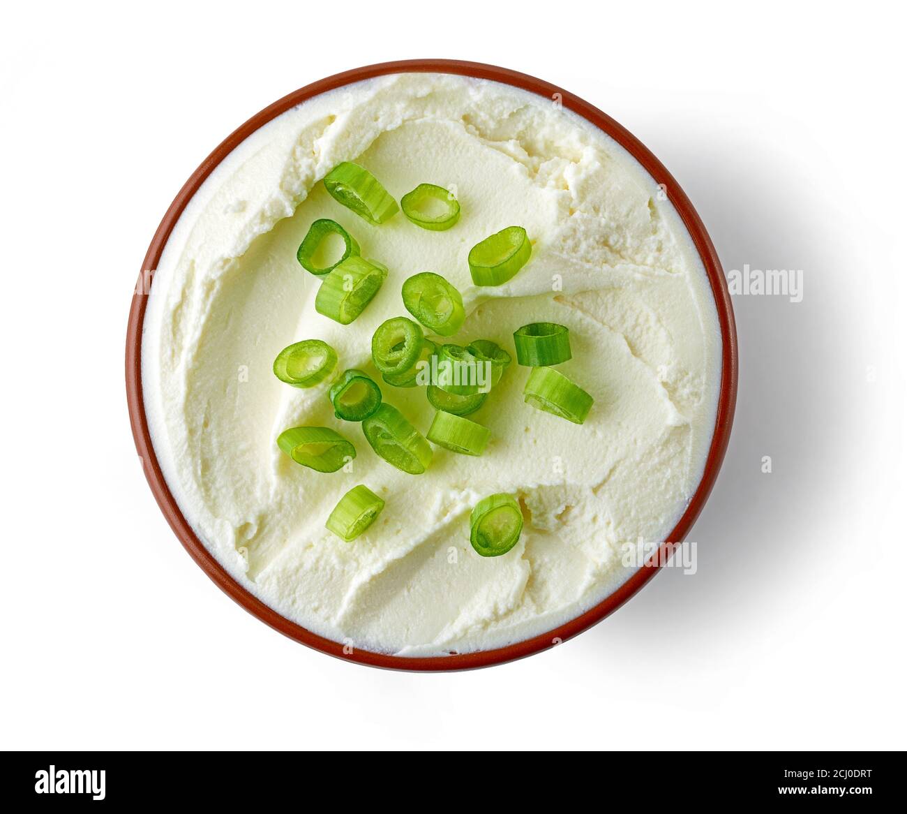 bowl of cream cheese with green onions isolated on white background ...