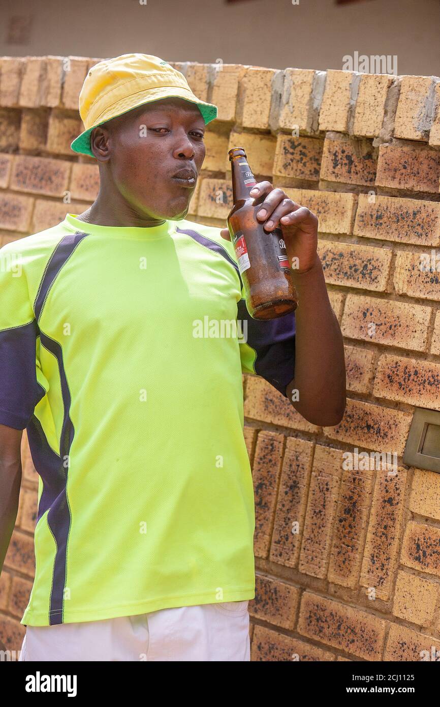 African man drinking alcohol in Soweto township, Johannesburg, South ...