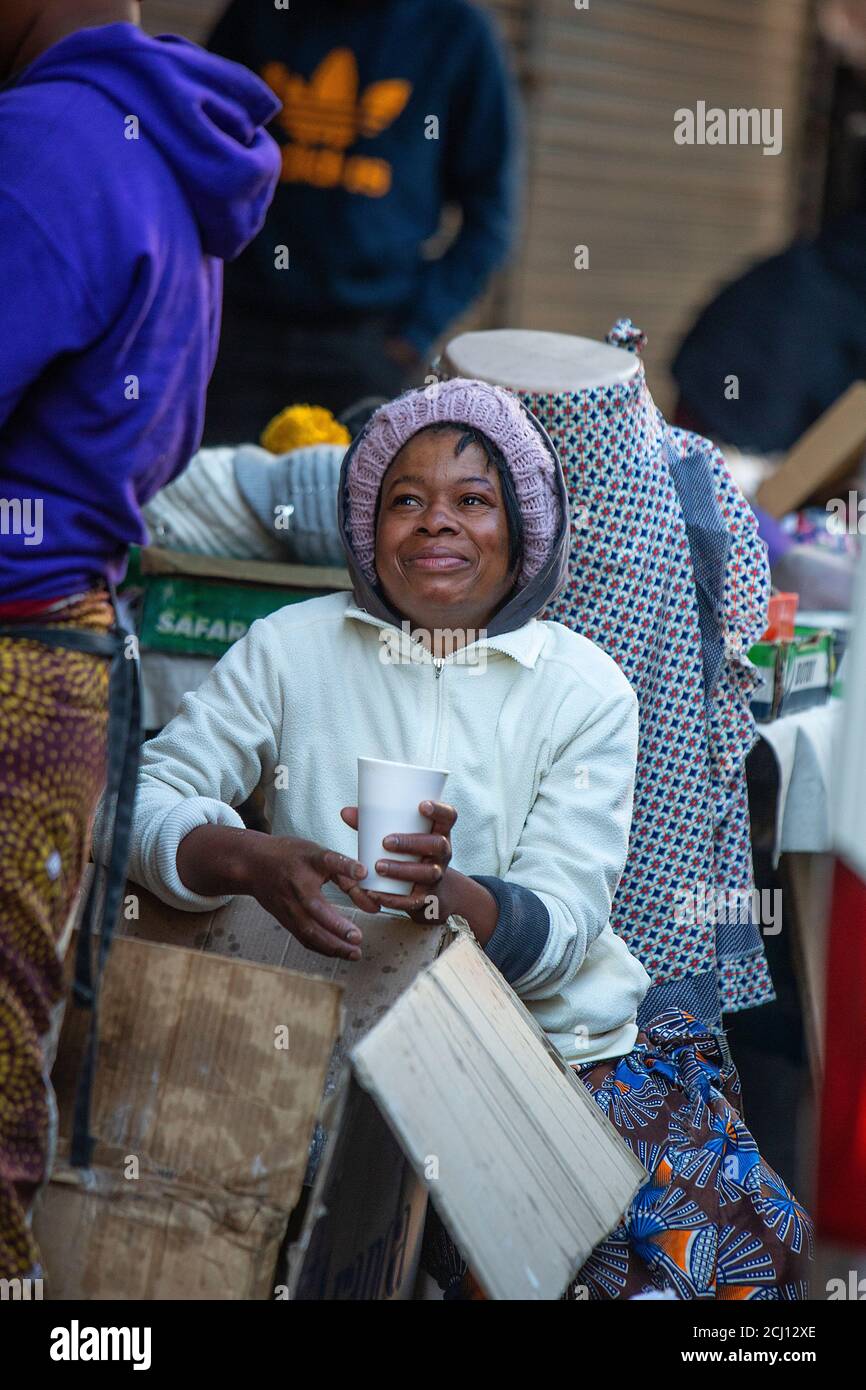 African homeless woman begging in Johannesburg, South Africa Stock ...