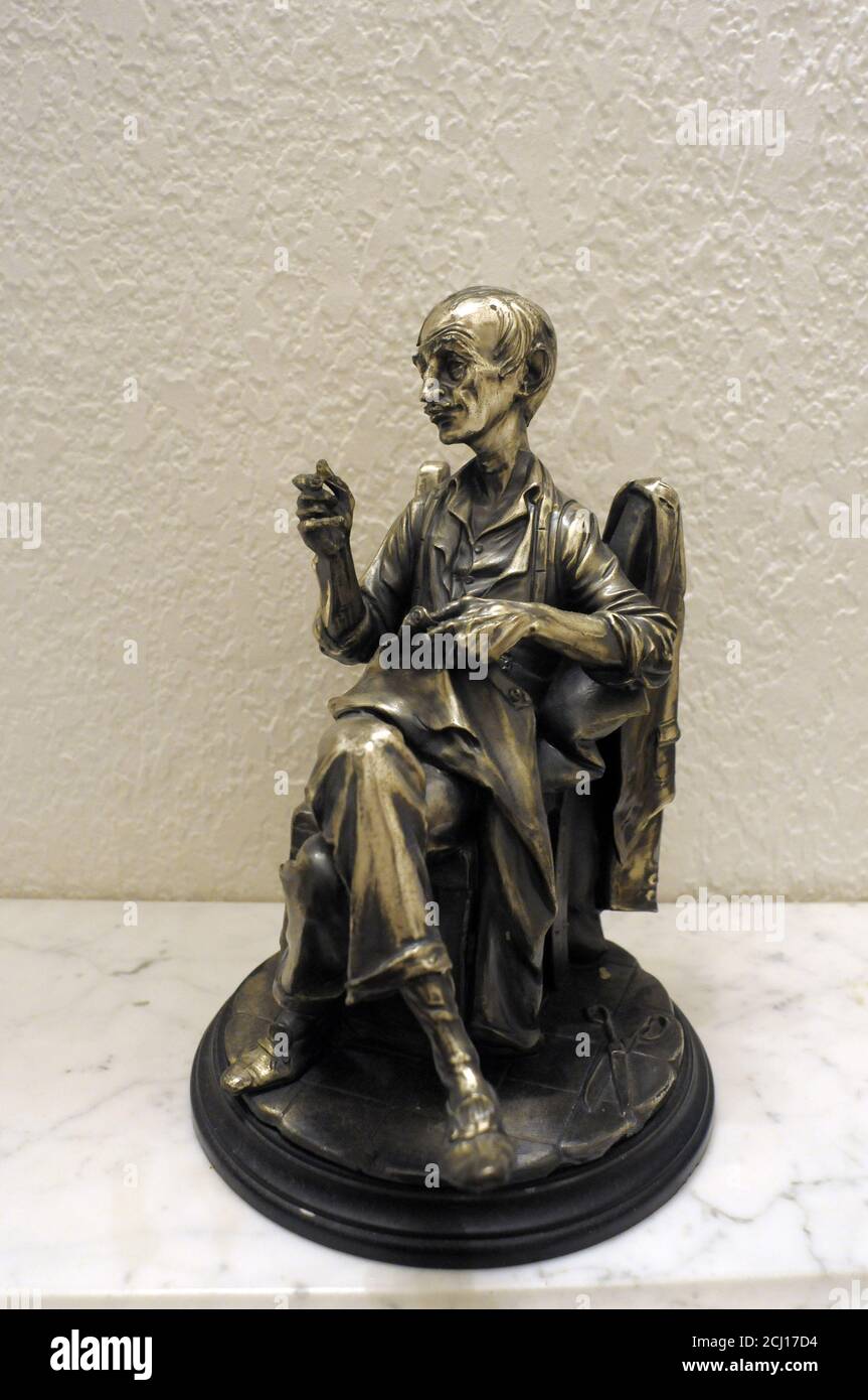 old man figure sewing Stock Photo - Alamy