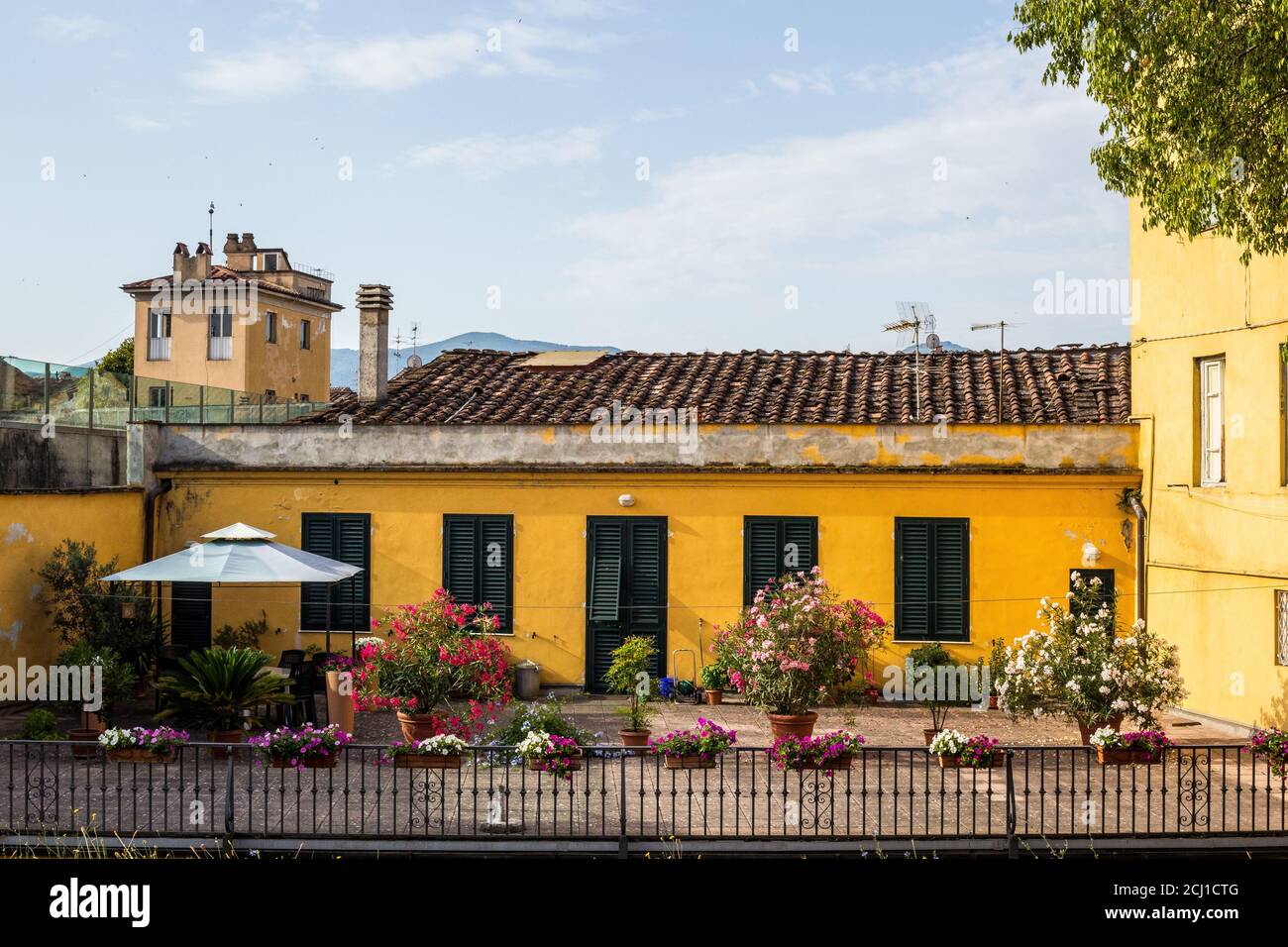 Balcony flowers in tuscany hi-res stock photography and images - Alamy