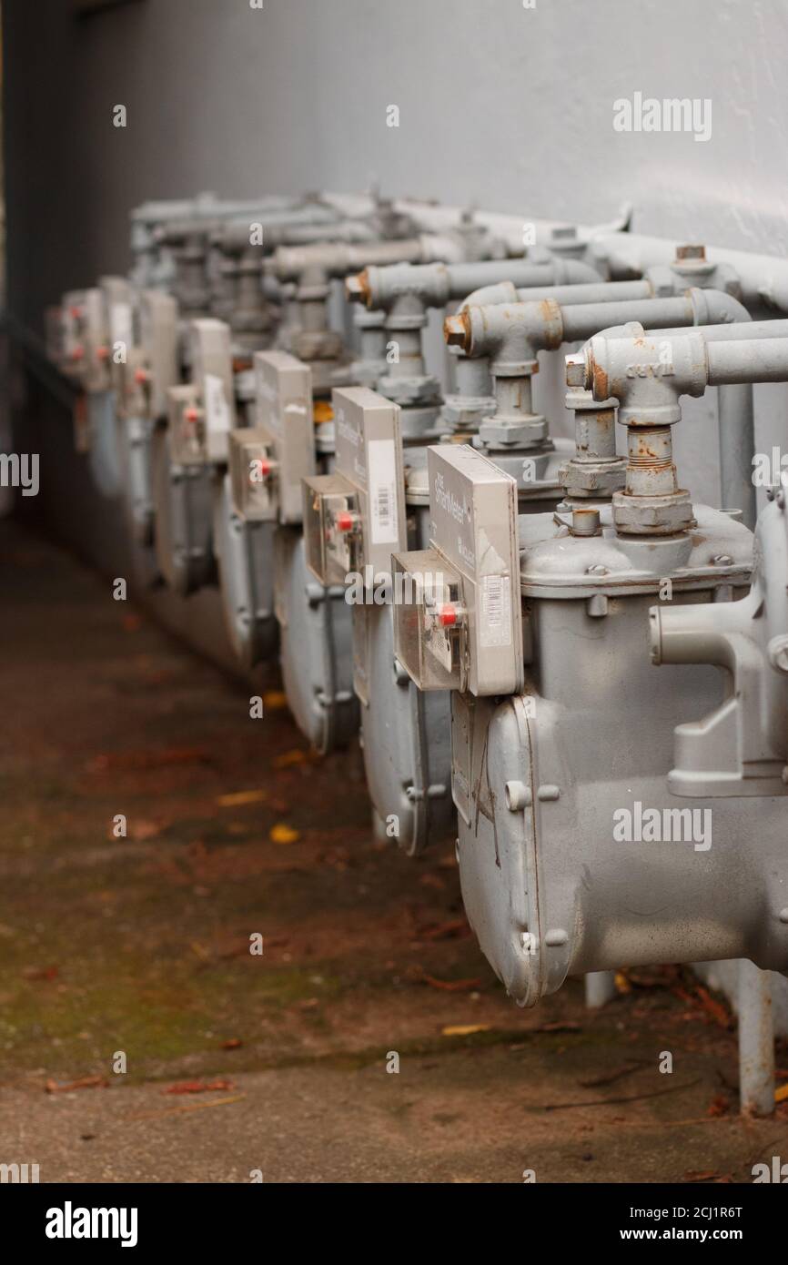 Set of the gray painted iron pipes in the factory Stock Photo - Alamy