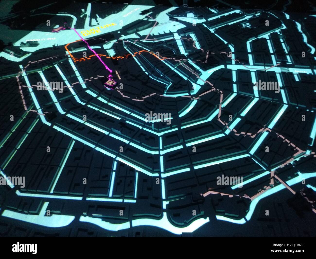 modern neon illuminated street map in the dark of the urban city of ...
