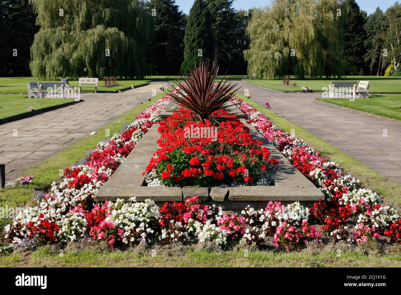 Bedding plants in flower display in public garden, summer flower ...