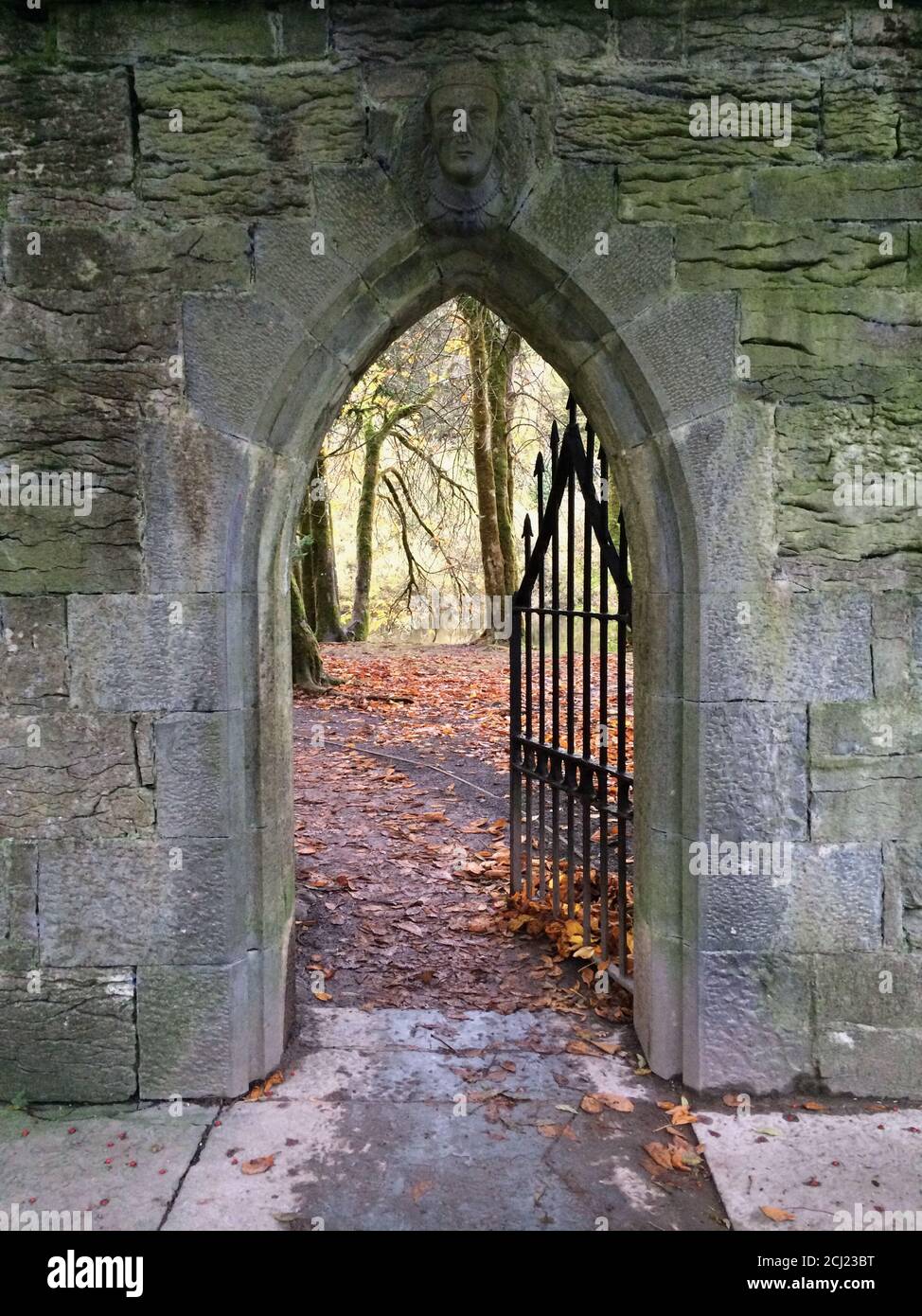 View of an old brick entrance arch to a park Stock Photo - Alamy