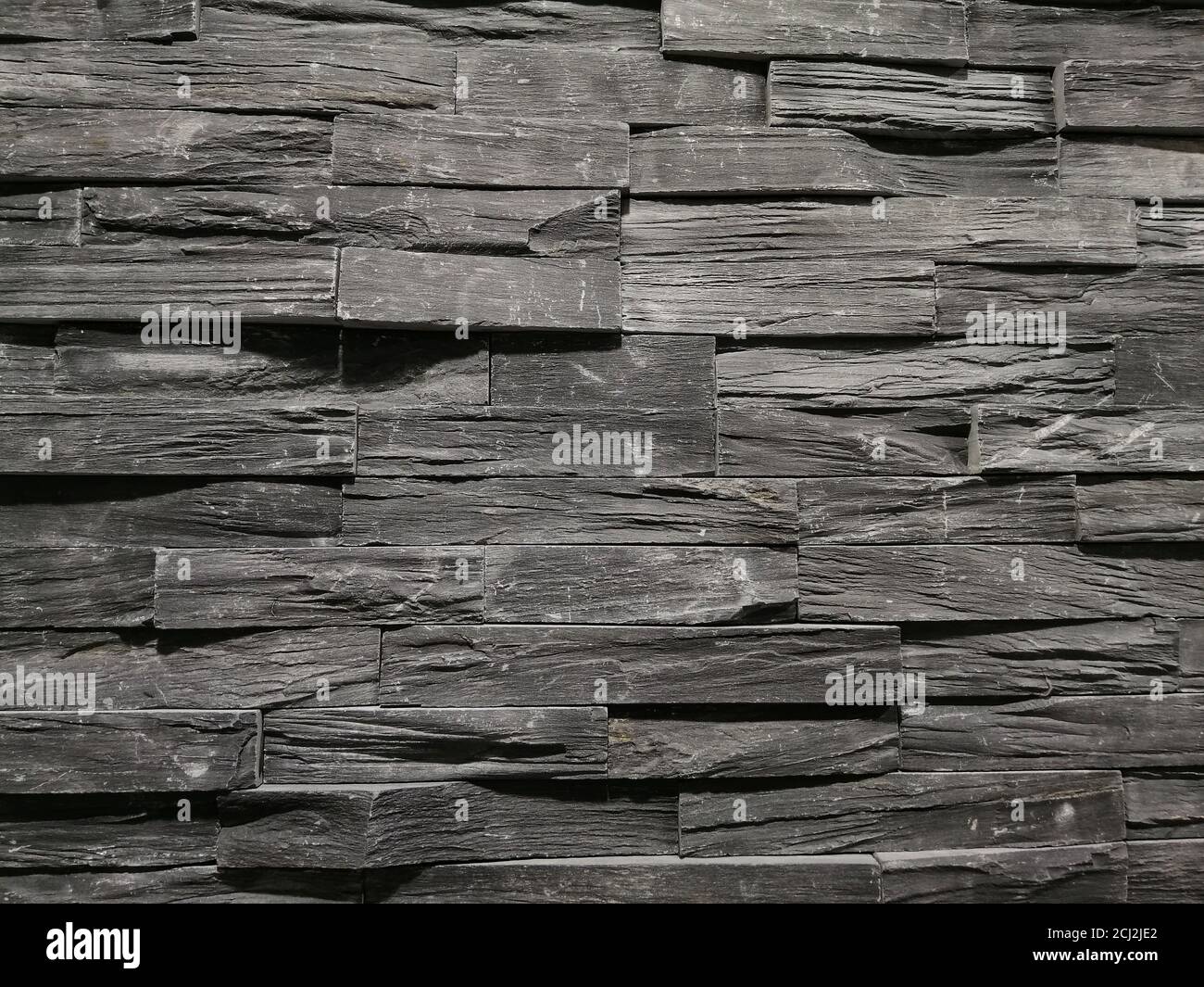 Closeup shot of an abstract stone wall Stock Photo - Alamy