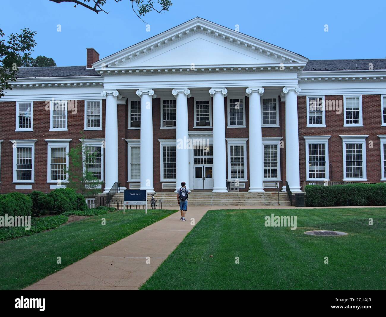 Front of brick college type building with white columns, University of ...