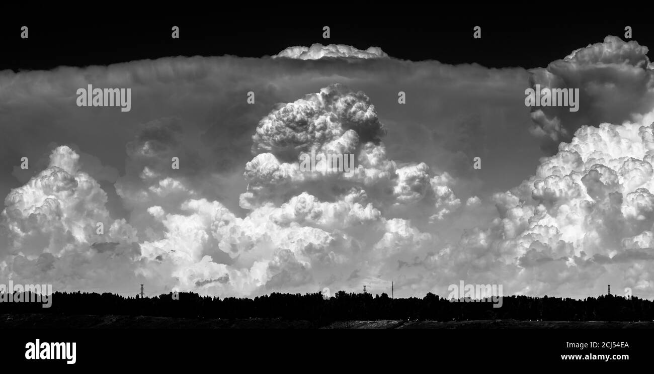 Cumulonimbus clouds rain Black and White Stock Photos & Images - Alamy