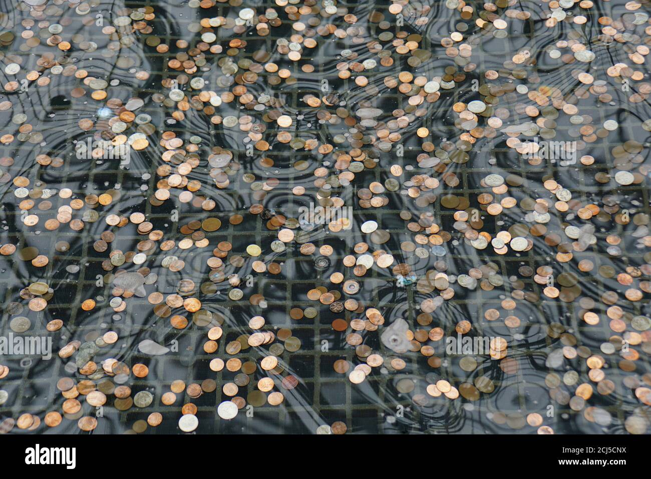 Wishing well coins hi-res stock photography and images - Alamy