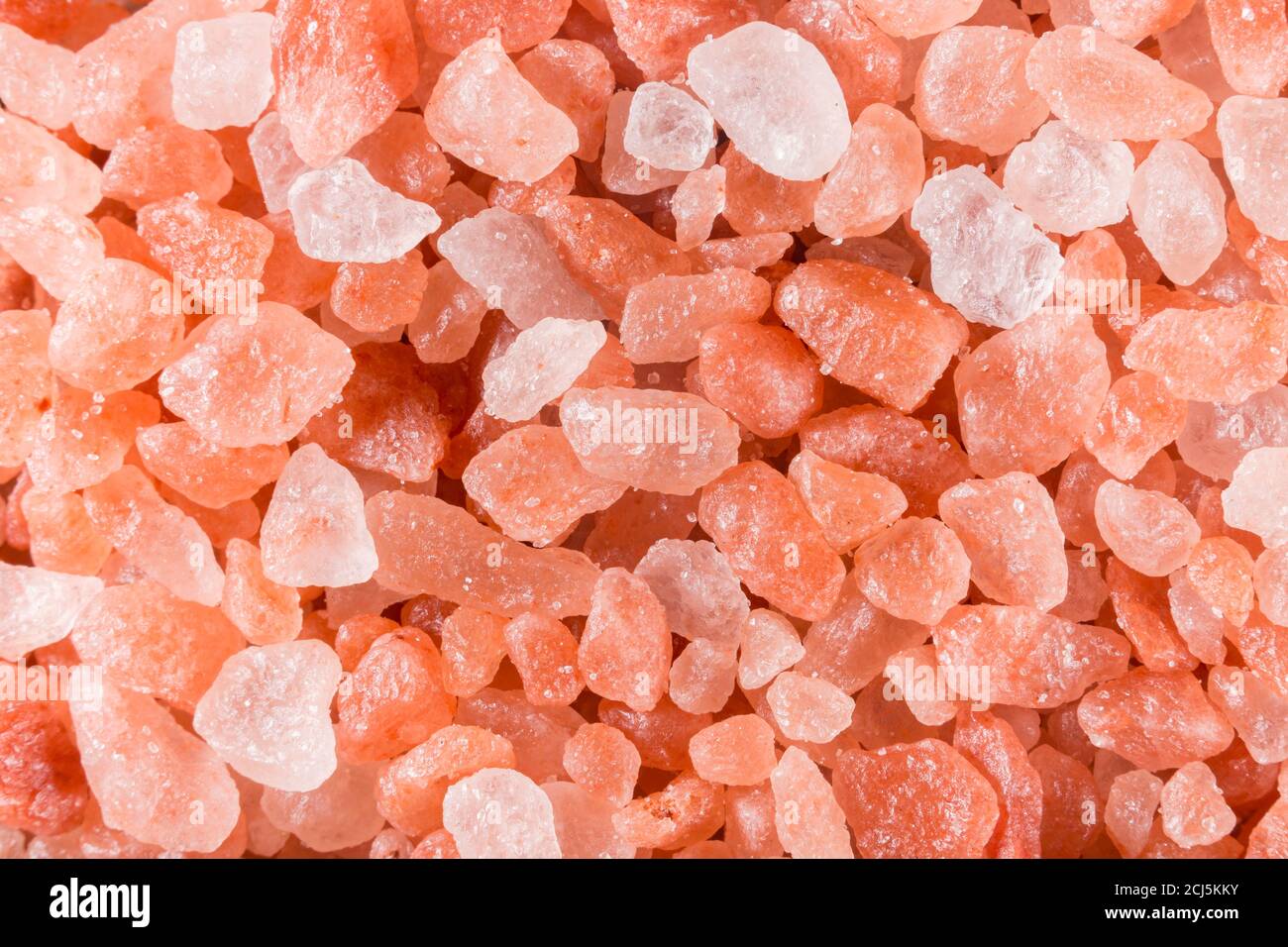 Pile of pink Himalayan salt on the table Stock Photo - Alamy