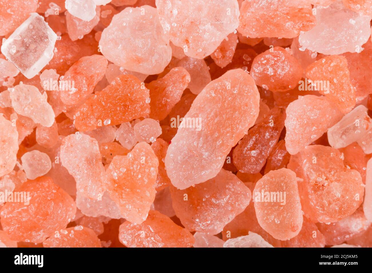 Pile of pink Himalayan salt on the table Stock Photo - Alamy