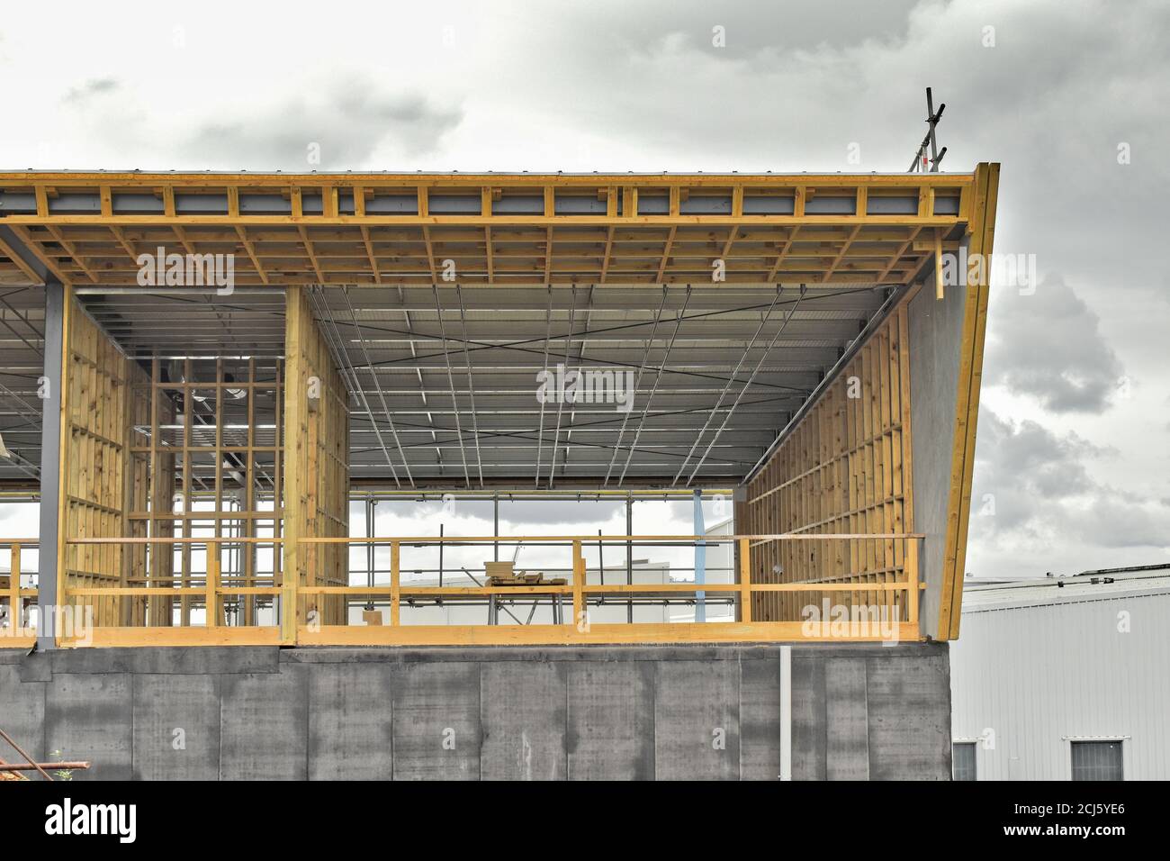 Interior wooden frame exposed inside a concrete slab commercial ...