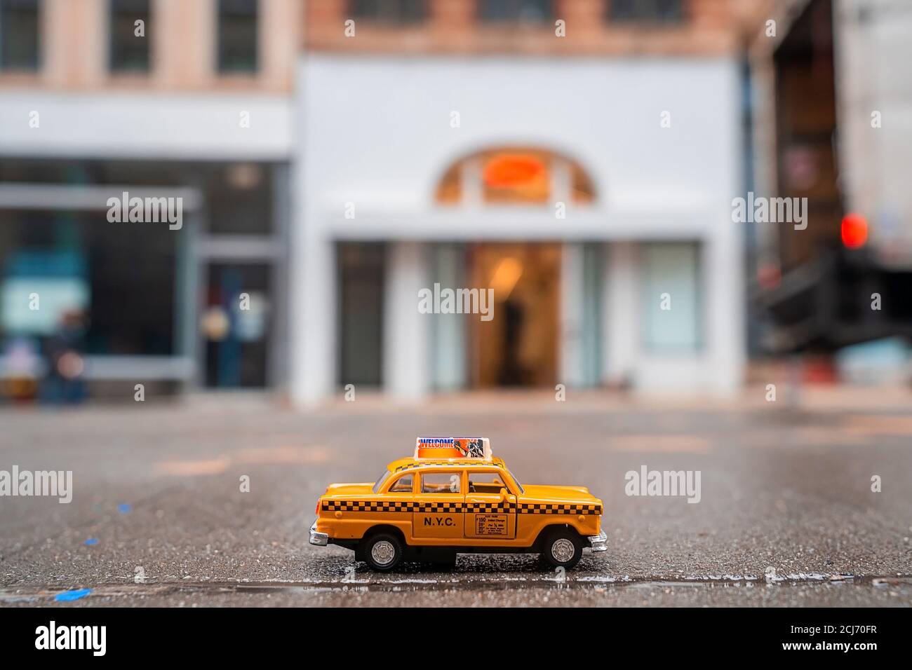 NYC taxi model parked on the Broadway Stock Photo - Alamy