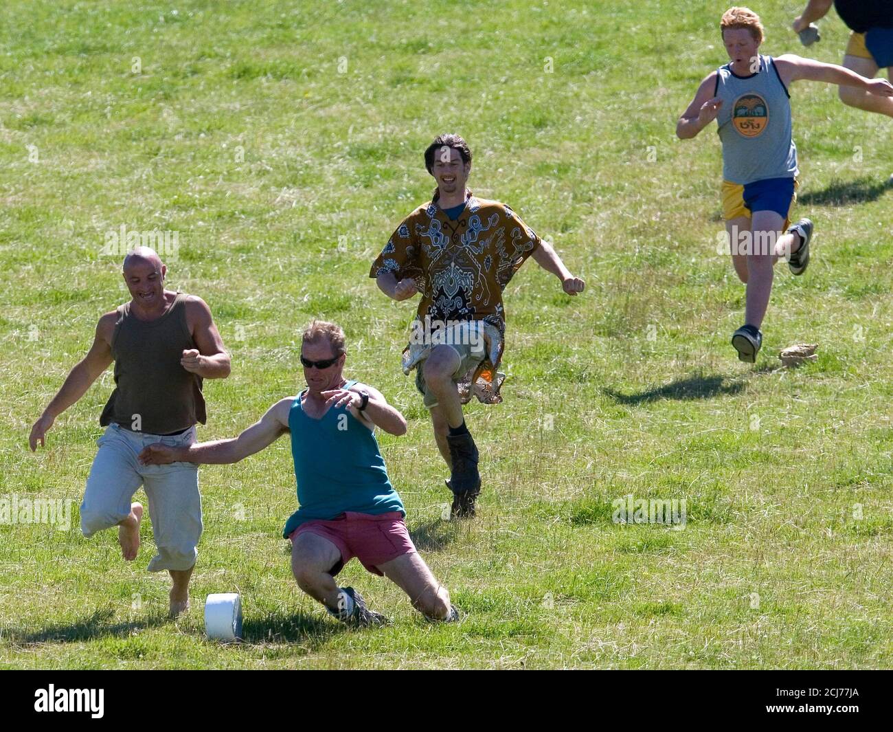 Cheese wheel chasing hi-res stock photography and images - Alamy