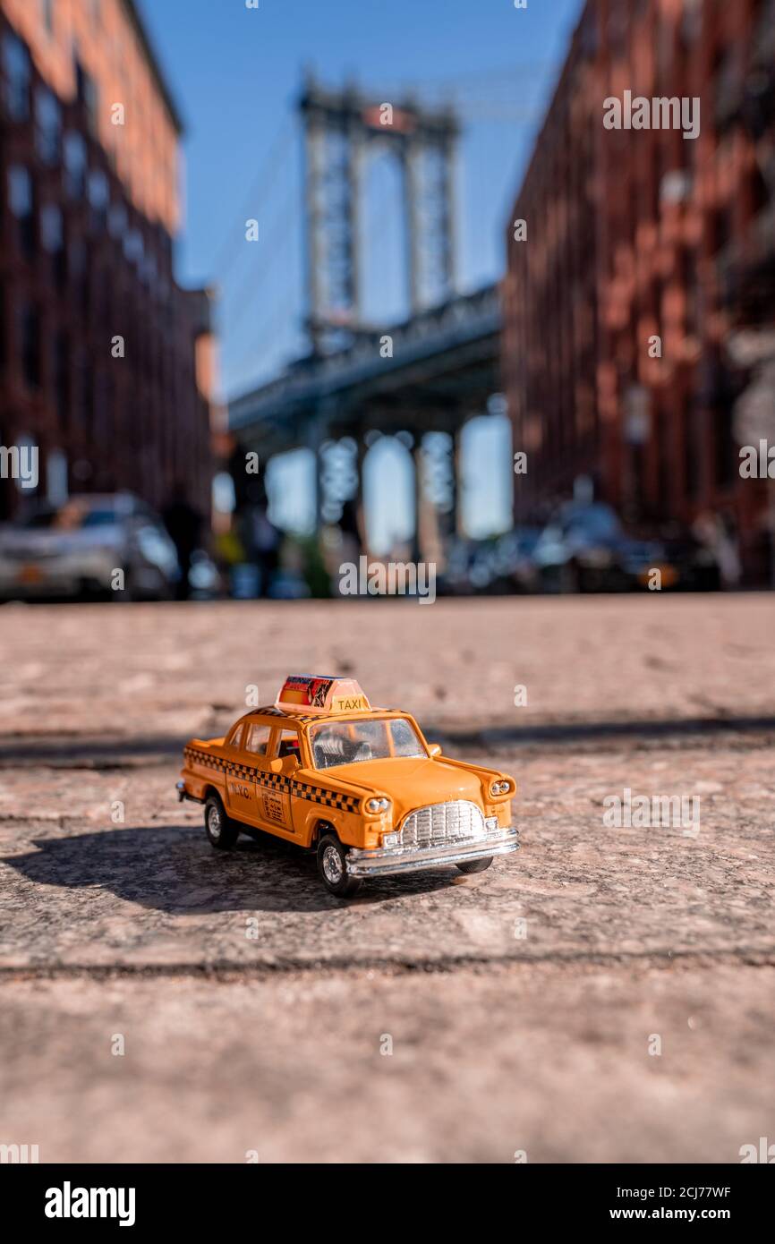 Vertical shot of a taxi model on Washington street in New York, USA ...