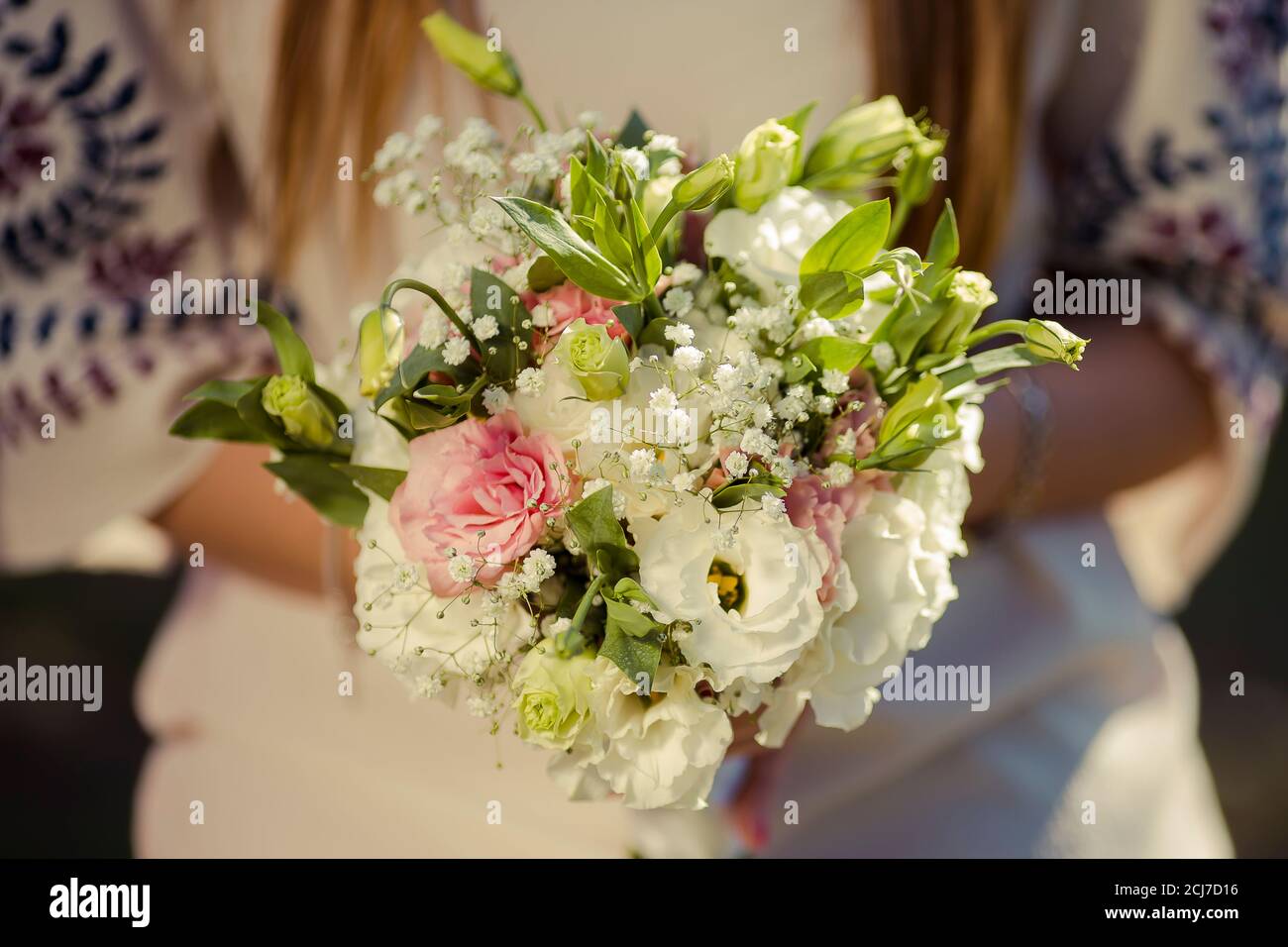 Florist hands with big floral bouquet Stock Photo - Alamy