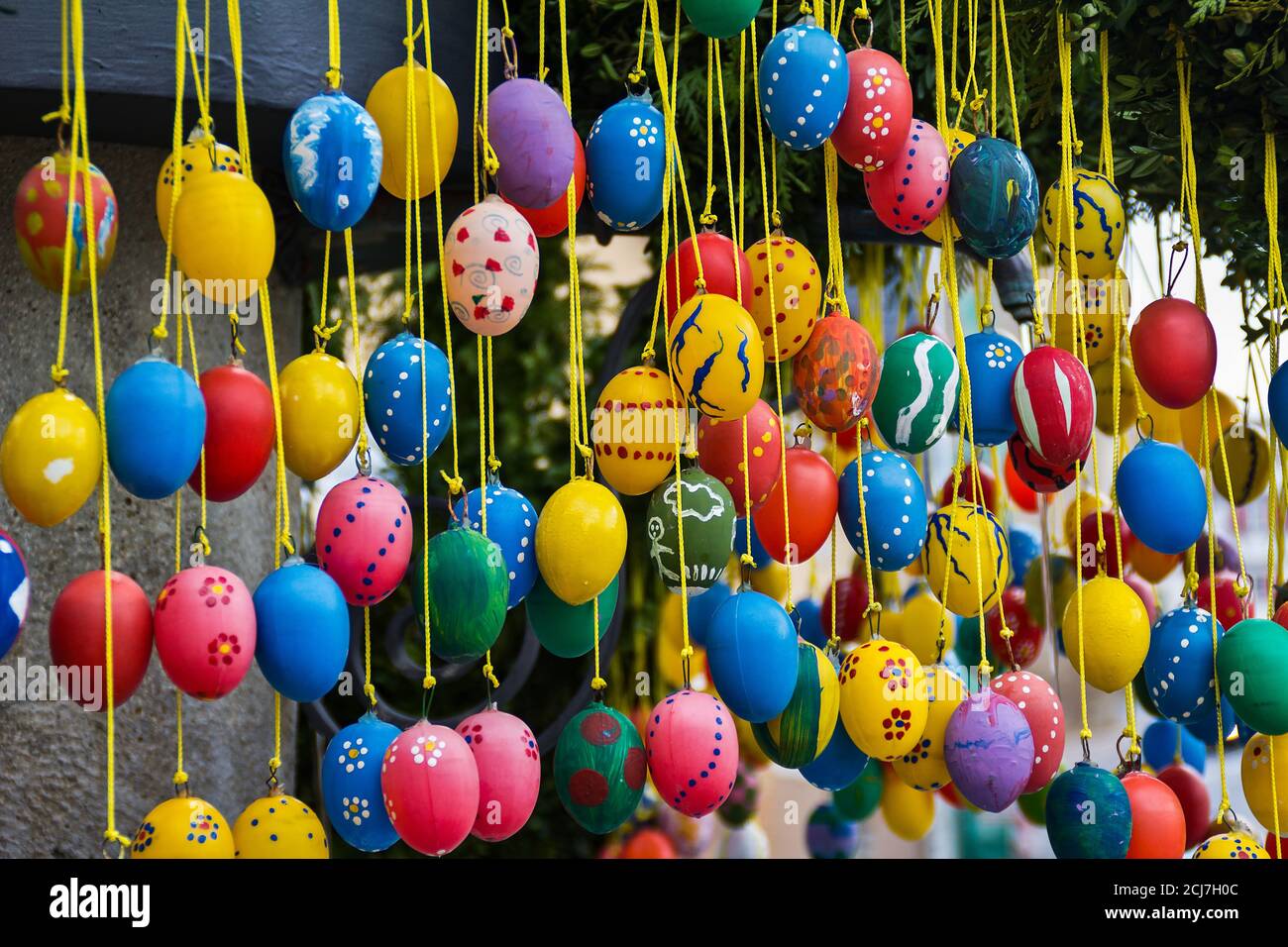 Closeup of colorful Eastern eggs holding from ropes Stock Photo - Alamy