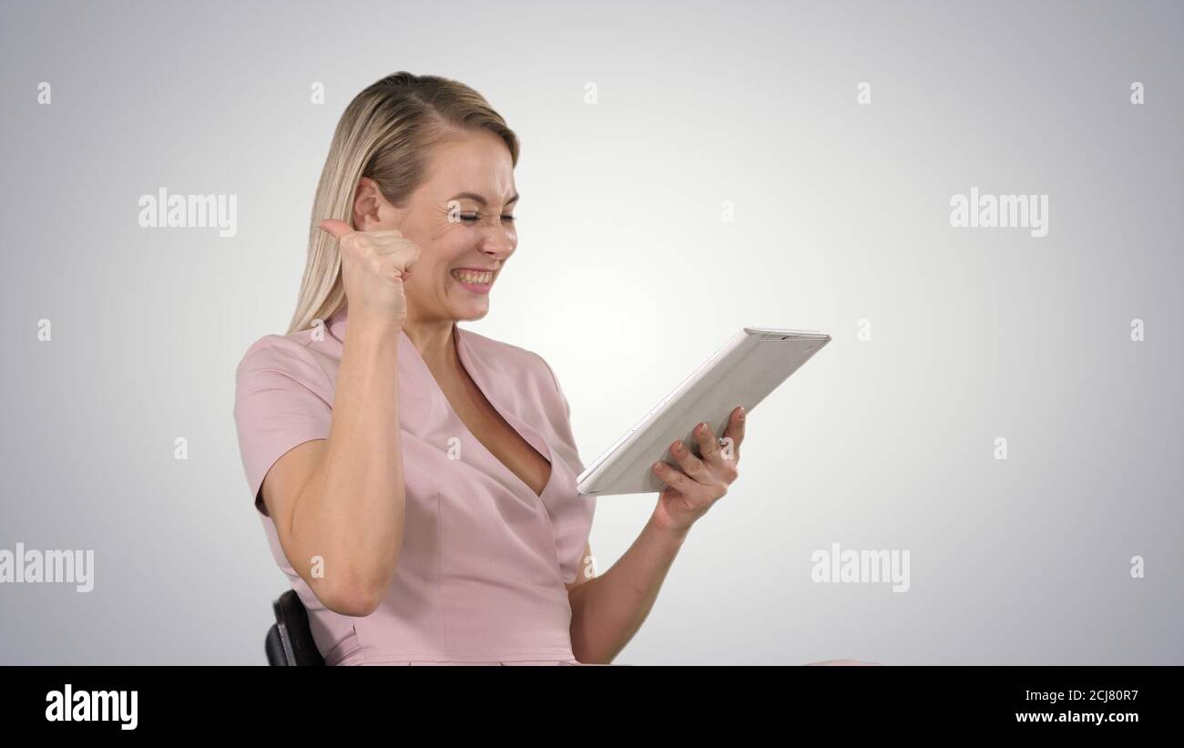 Woman sitting wall browsing hi-res stock photography and images - Alamy