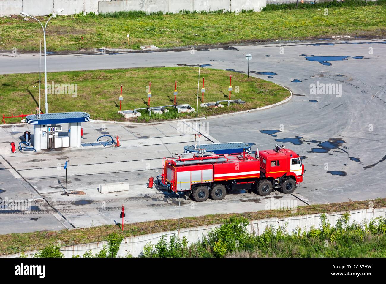 Airfield fire truck at a gas station Stock Photo - Alamy