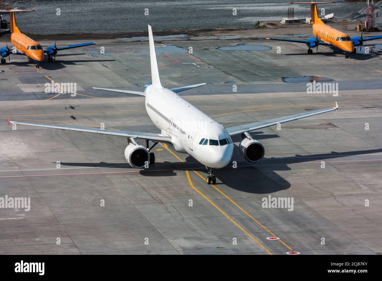 The aircraft taxiing to a parking Stock Photo - Alamy