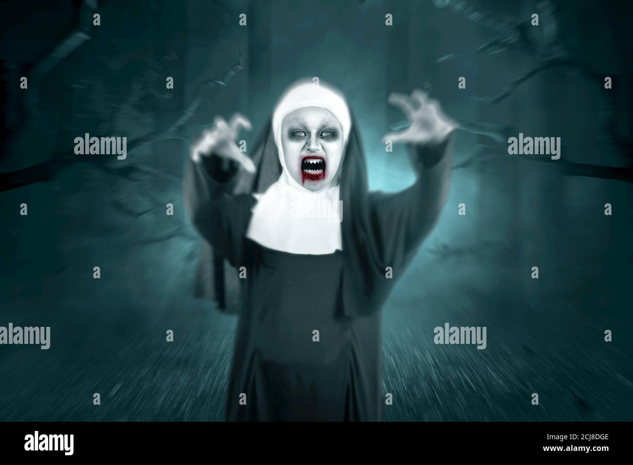 Scary devil nun standing on the haunted forest Stock Photo - Alamy